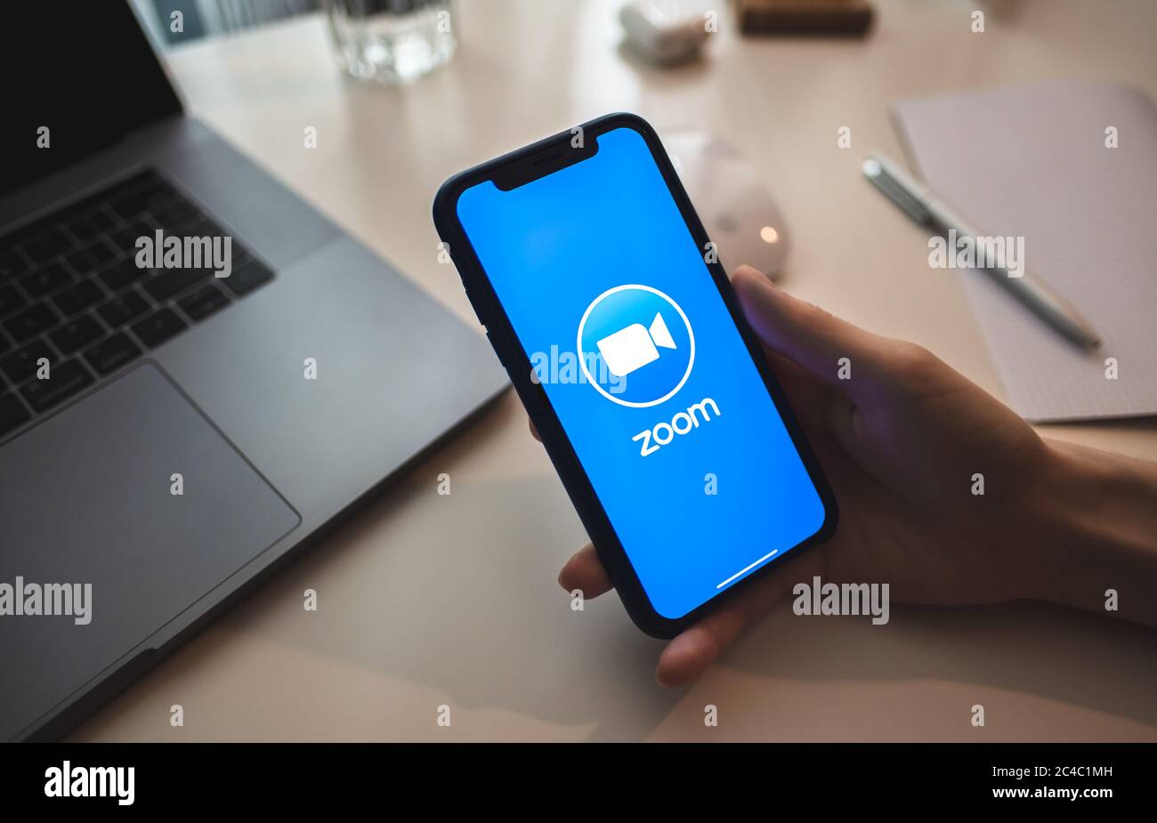 zoom video conference app logo on the smartphone screen Stock Photo - Alamy