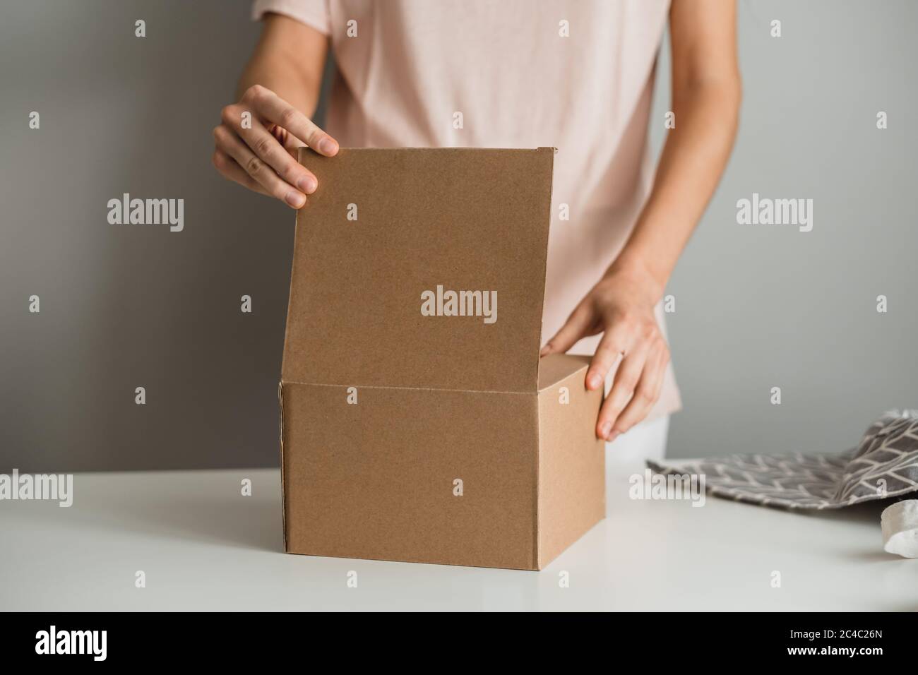 Woman blank cardboard box hi-res stock photography and images - Alamy