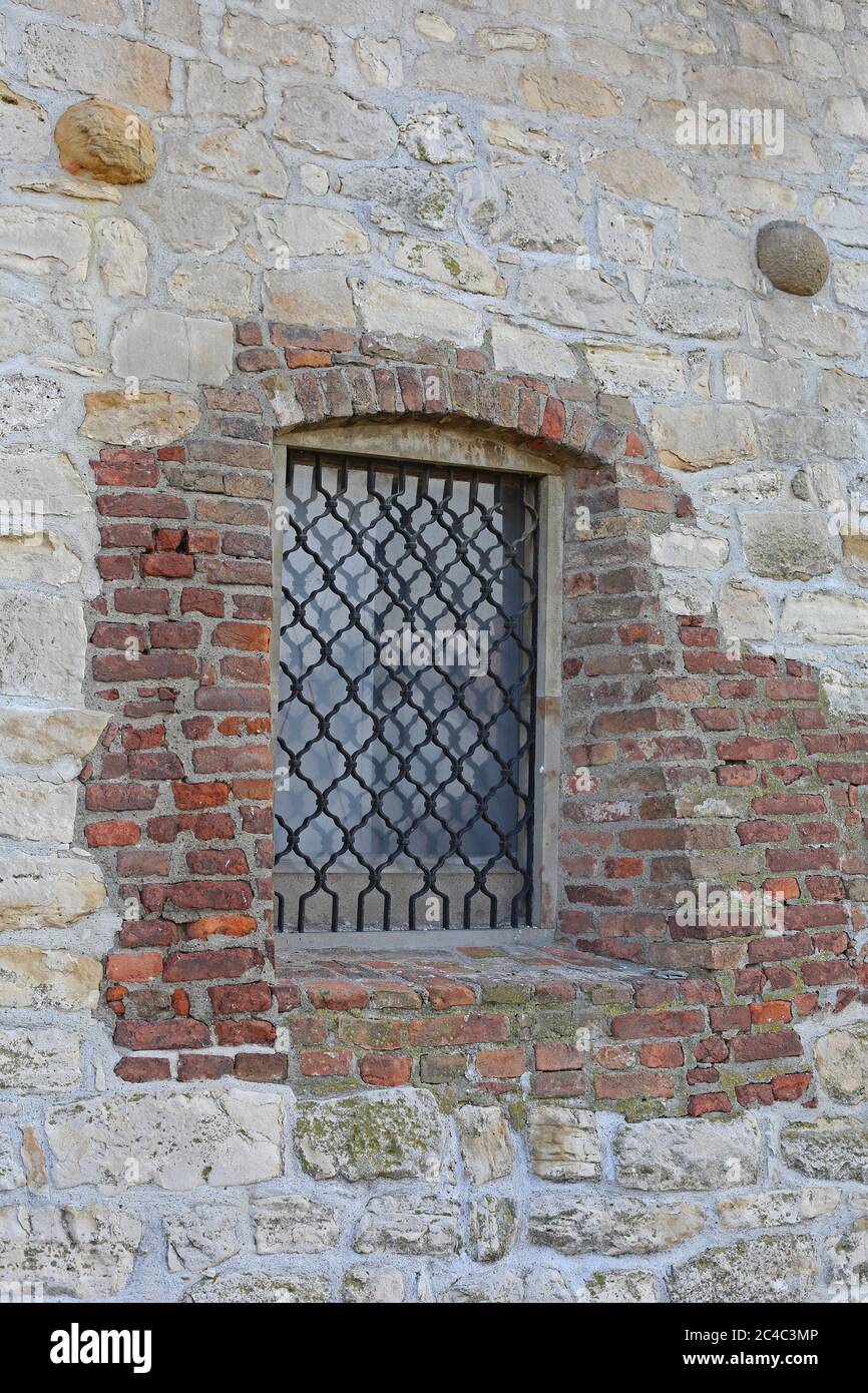 Window Hole With Metal Bars in Brick Wall Stock Photo - Alamy
