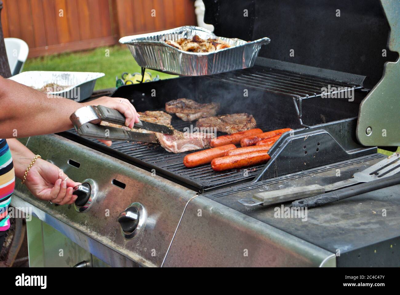 food on the grill at a backyard cookout Stock Photo - Alamy
