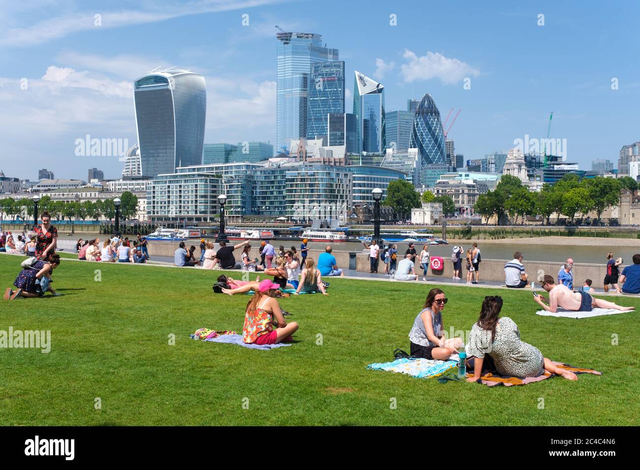 LONDON,UK - JULY 25,2019 : People enjoying summer near Tower Bridge in ...