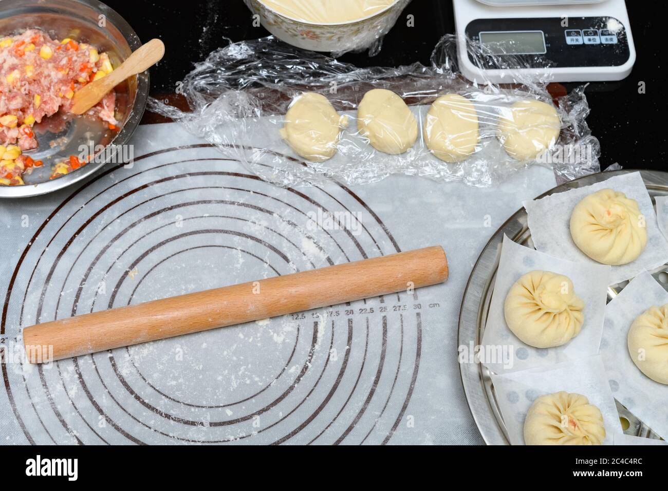 making traditional Chinese buns at home Stock Photo - Alamy