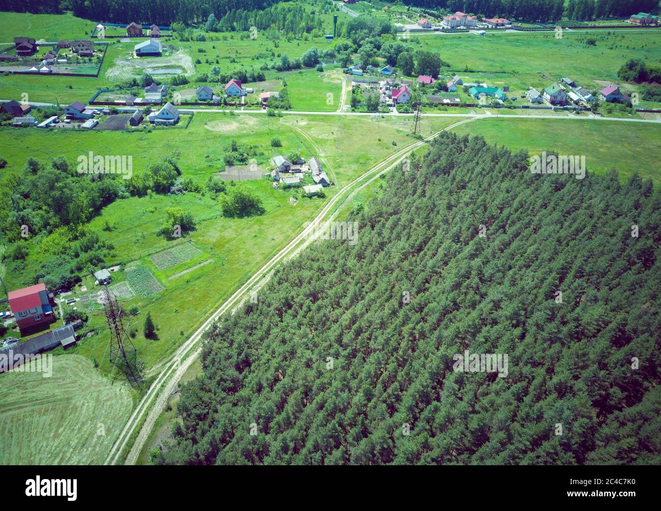 Aerial view of countryside in summer. Bird's eye view of village in ...