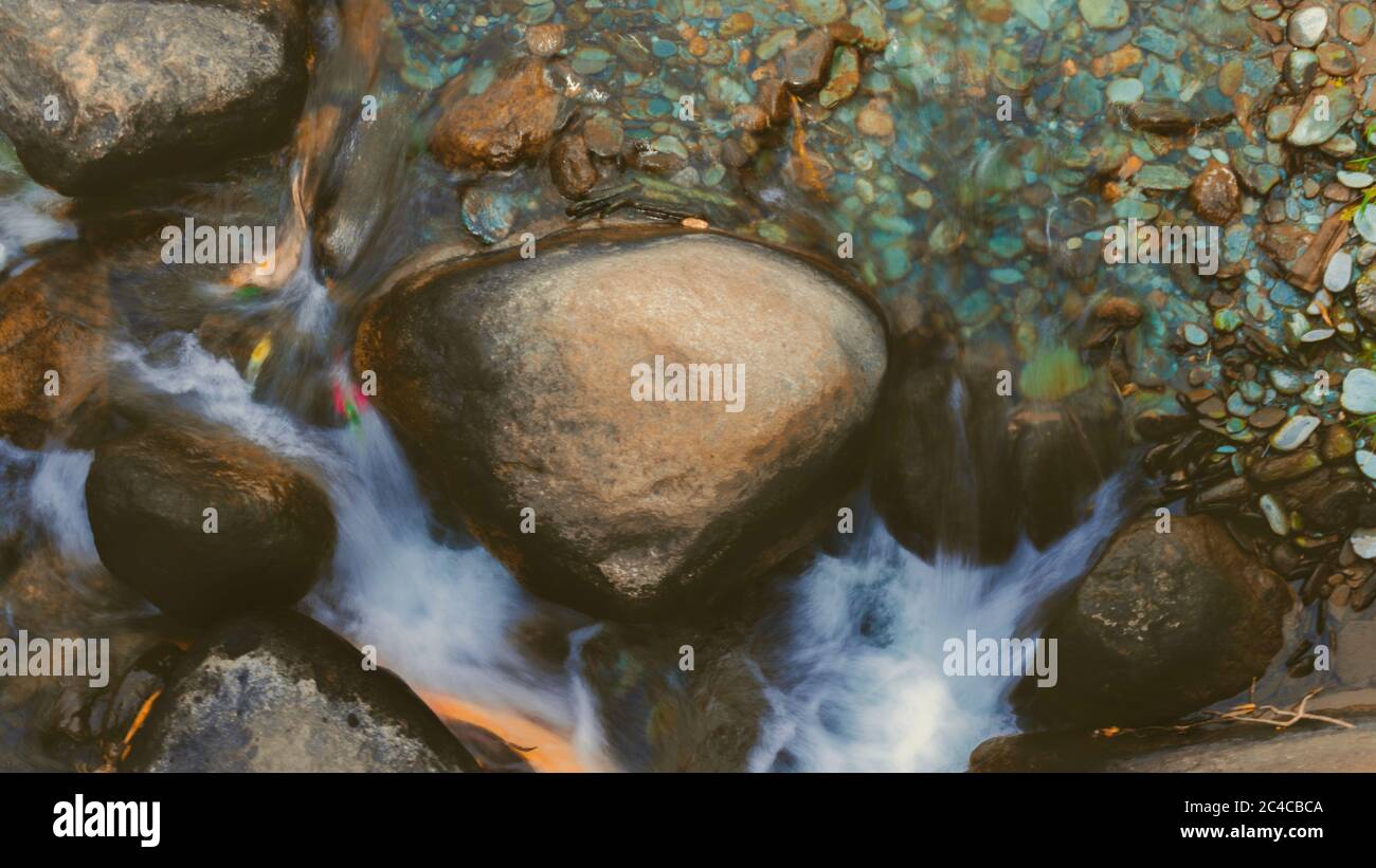 Water flowing through the rocks Stock Photo - Alamy