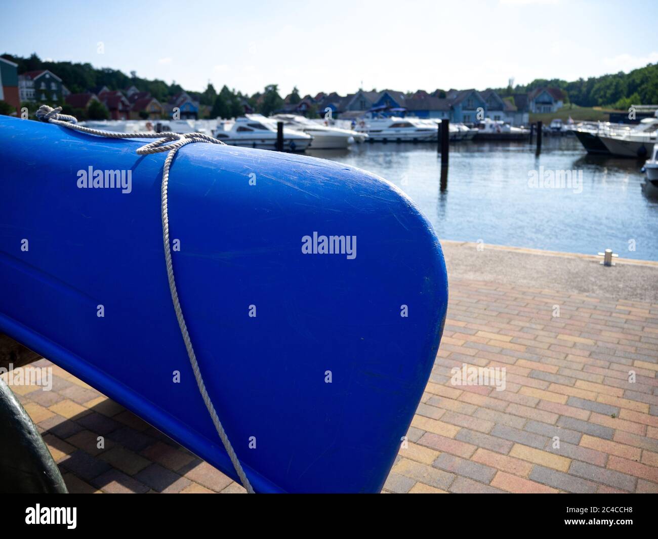 in a harbour many canoes are stacked side by side Stock Photo - Alamy