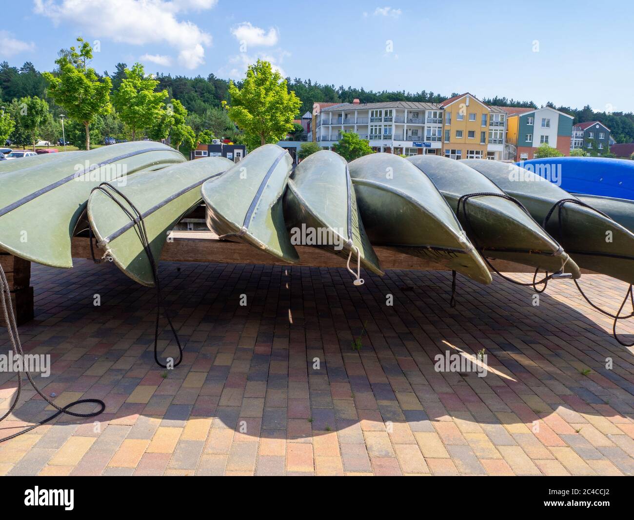 in a harbour many canoes are stacked side by side Stock Photo - Alamy