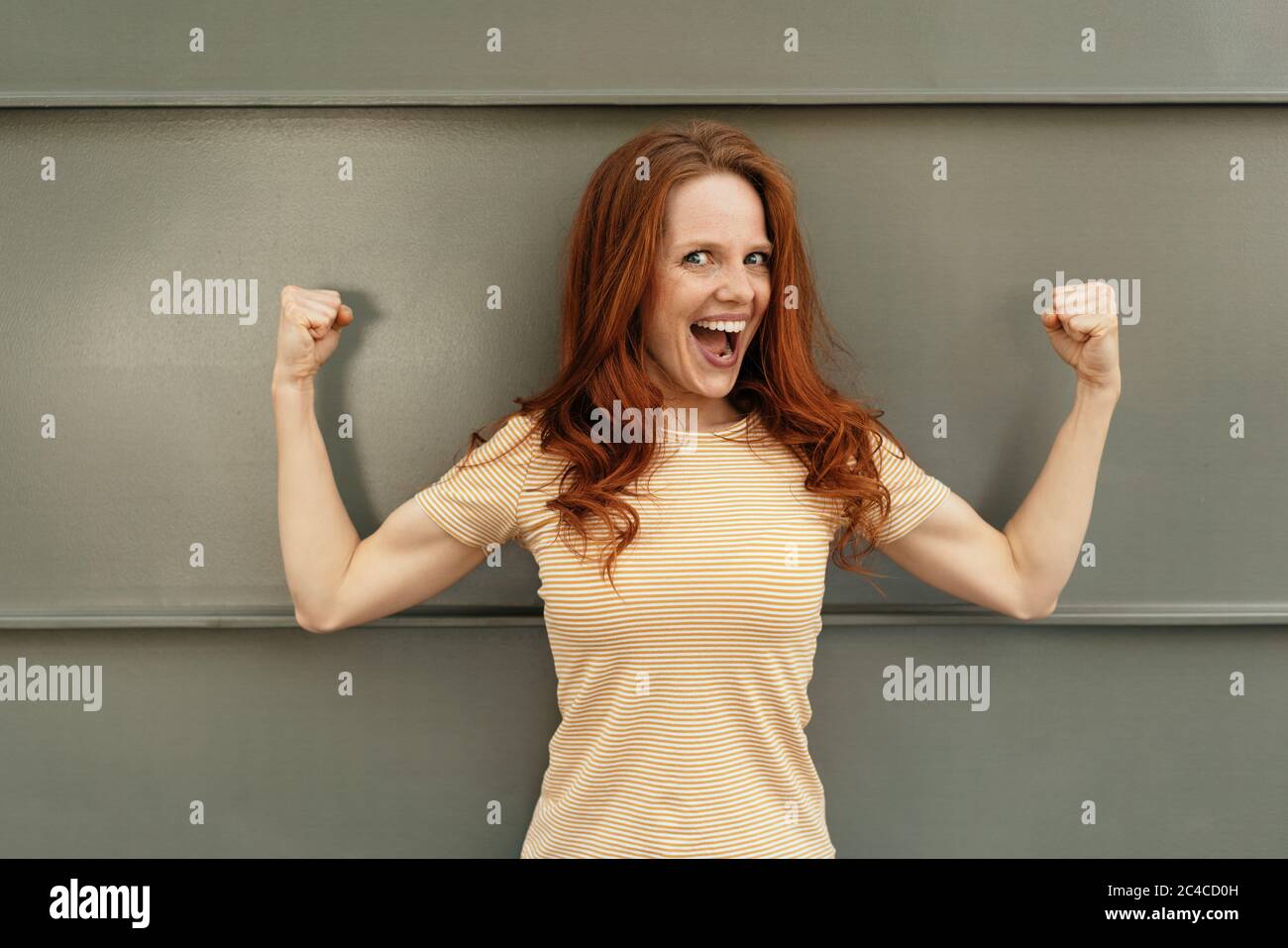 Woman flexing funny hi-res stock photography and images - Alamy
