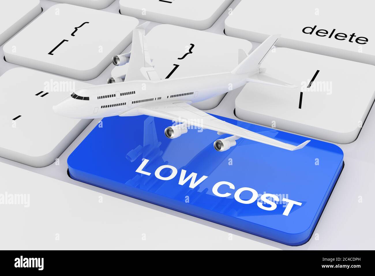 White Jet Passenger's Airplane over Computer Keyboard with Low Cost ...