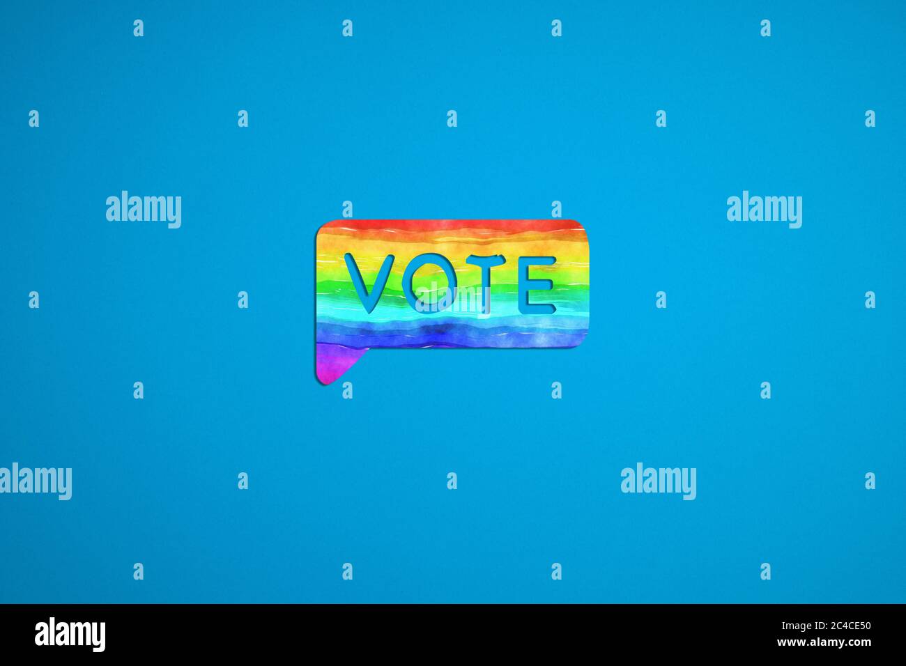 An election icon made by cutting colored paper. A blue background Stock ...