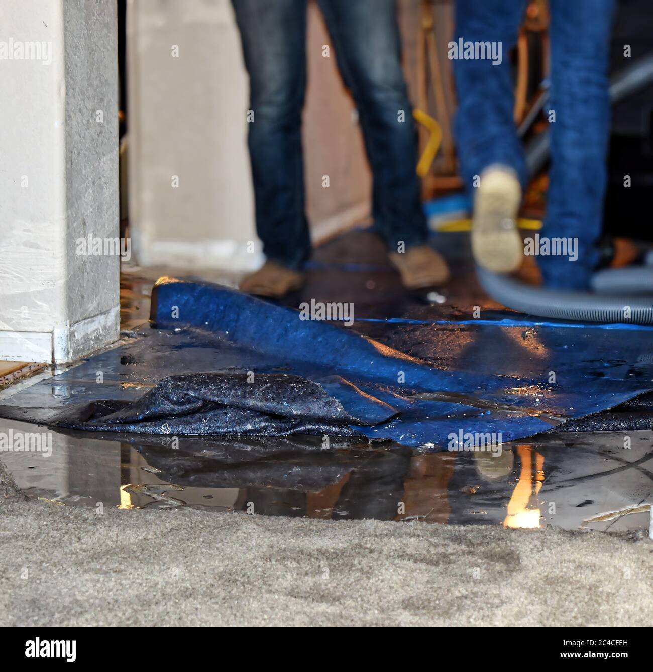 Water Damage to Floor with Water Removal Equipment Stock Photo - Alamy