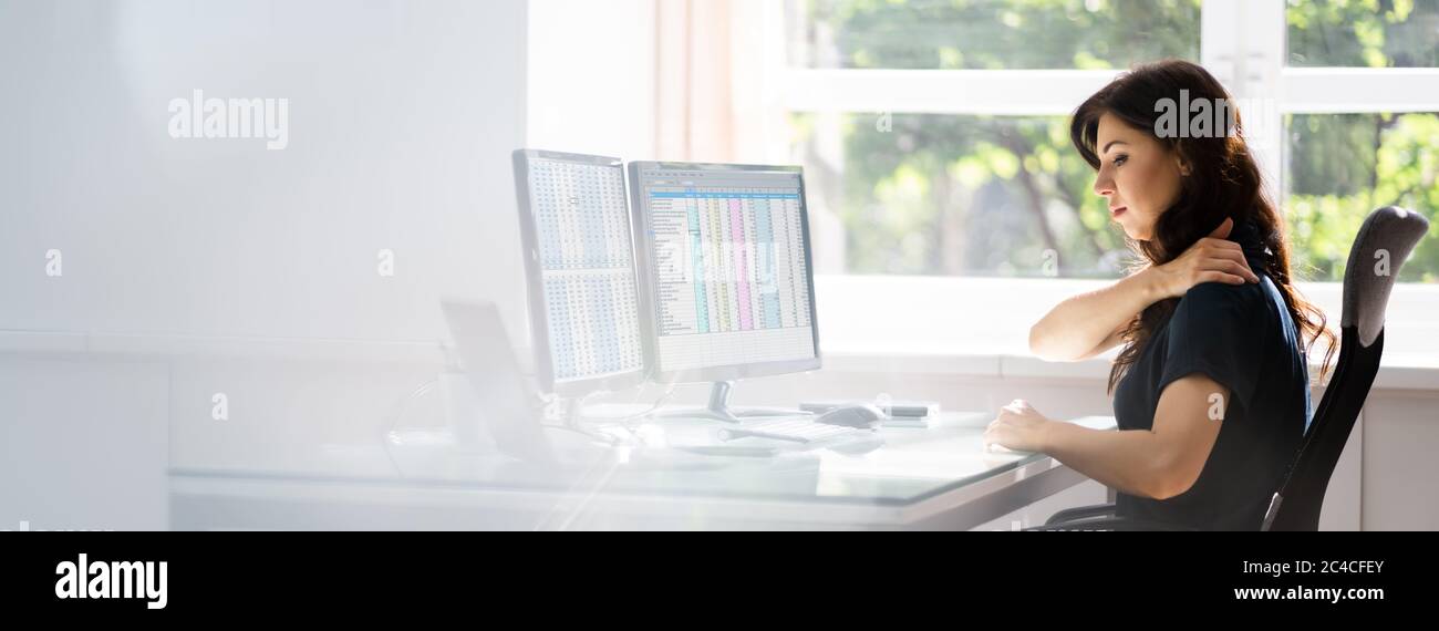 Neck Pain While Working At Computer. Bad Posture Stress Stock Photo - Alamy
