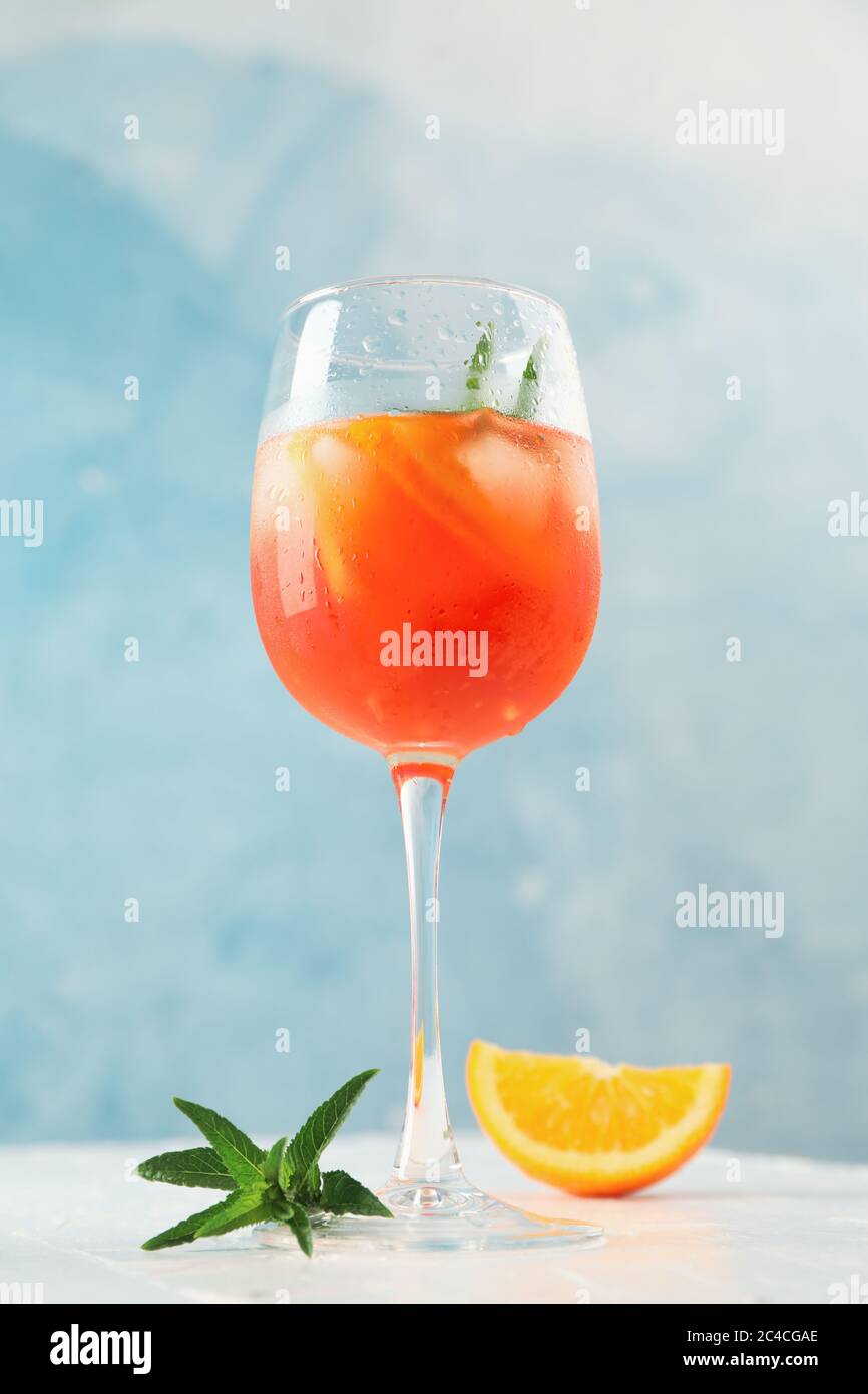 Composition with aperol spritz cocktail on color background. Summer ...