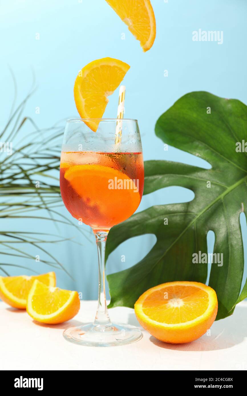 Composition with aperol spritz cocktail on color background. Summer ...