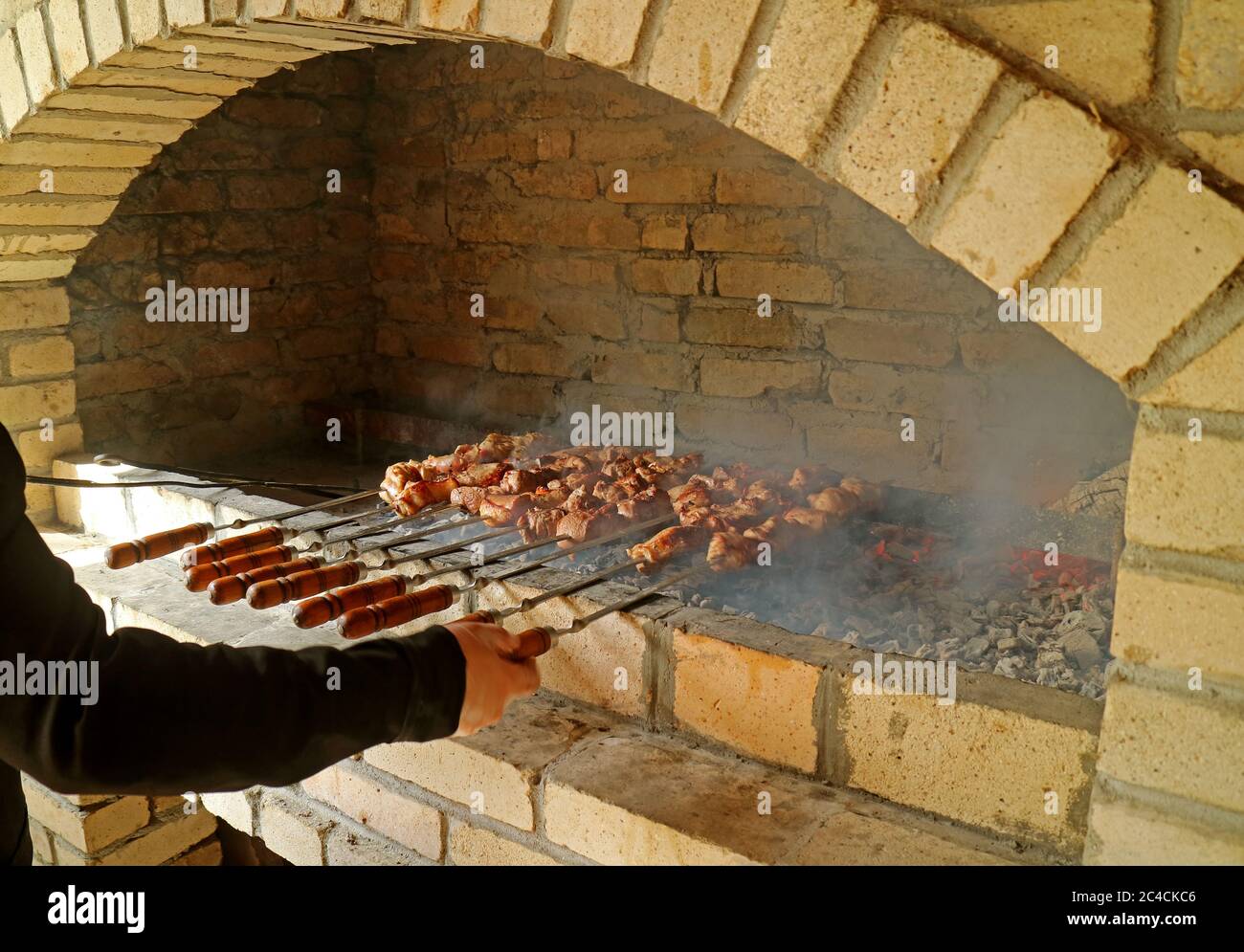 Armenian Barbecue or Khorovats Being Grilled on a Traditional Clay Oven ...