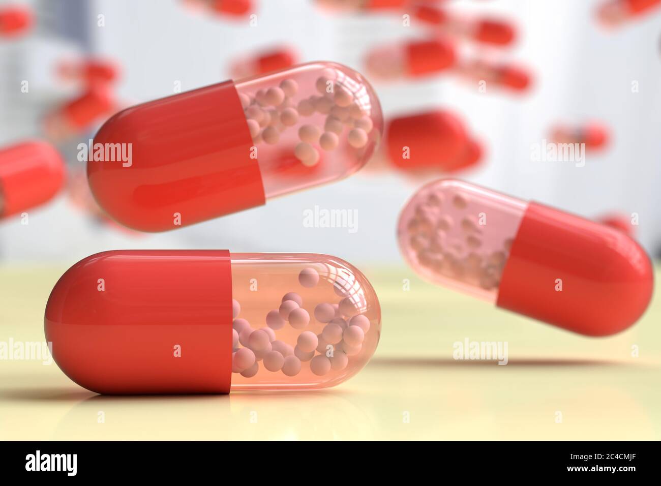 Falling capsules with a drug with nicely blurred background; 3d ...