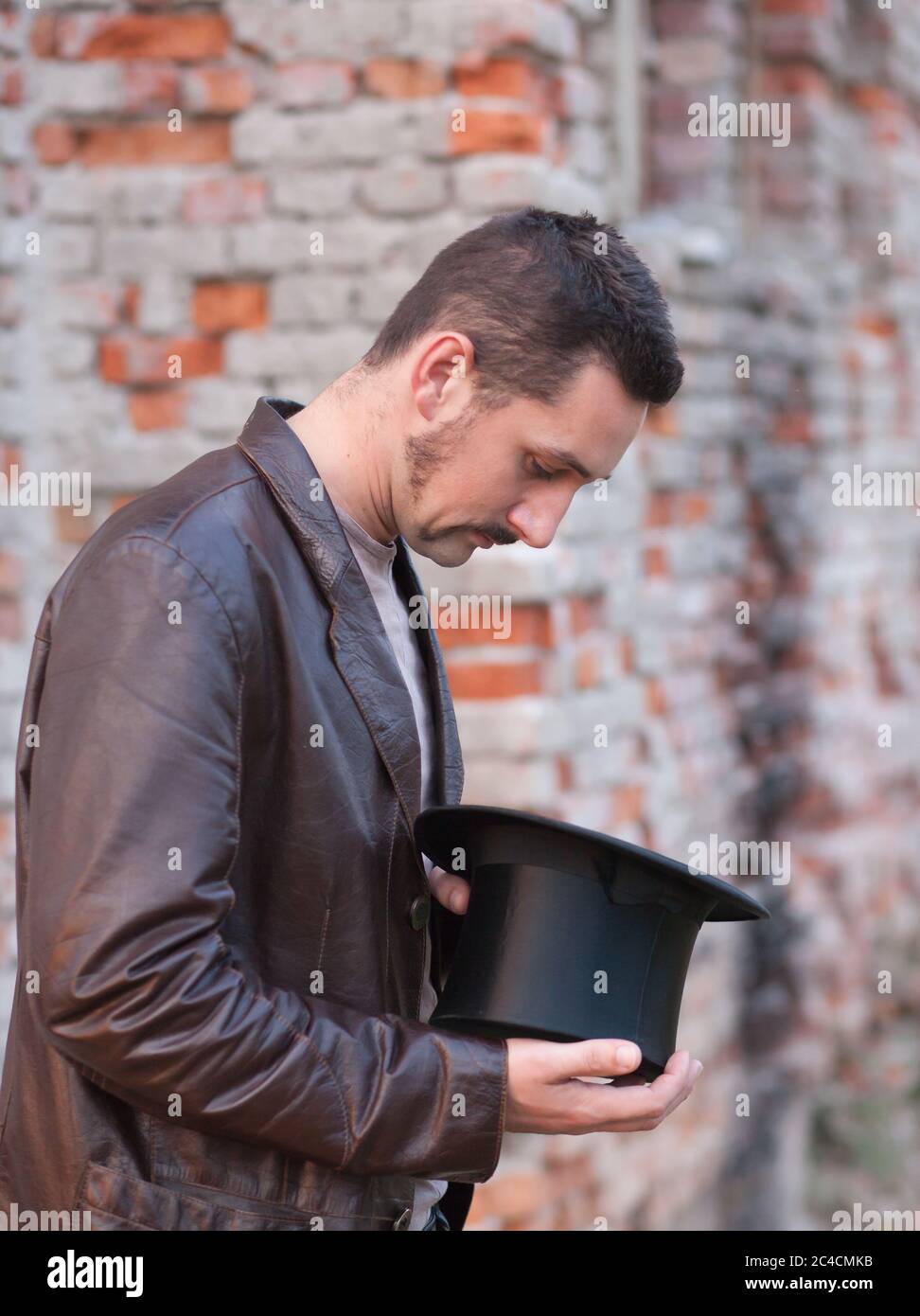 lifestyle young man with mustache, car, rock n roll Stock Photo - Alamy