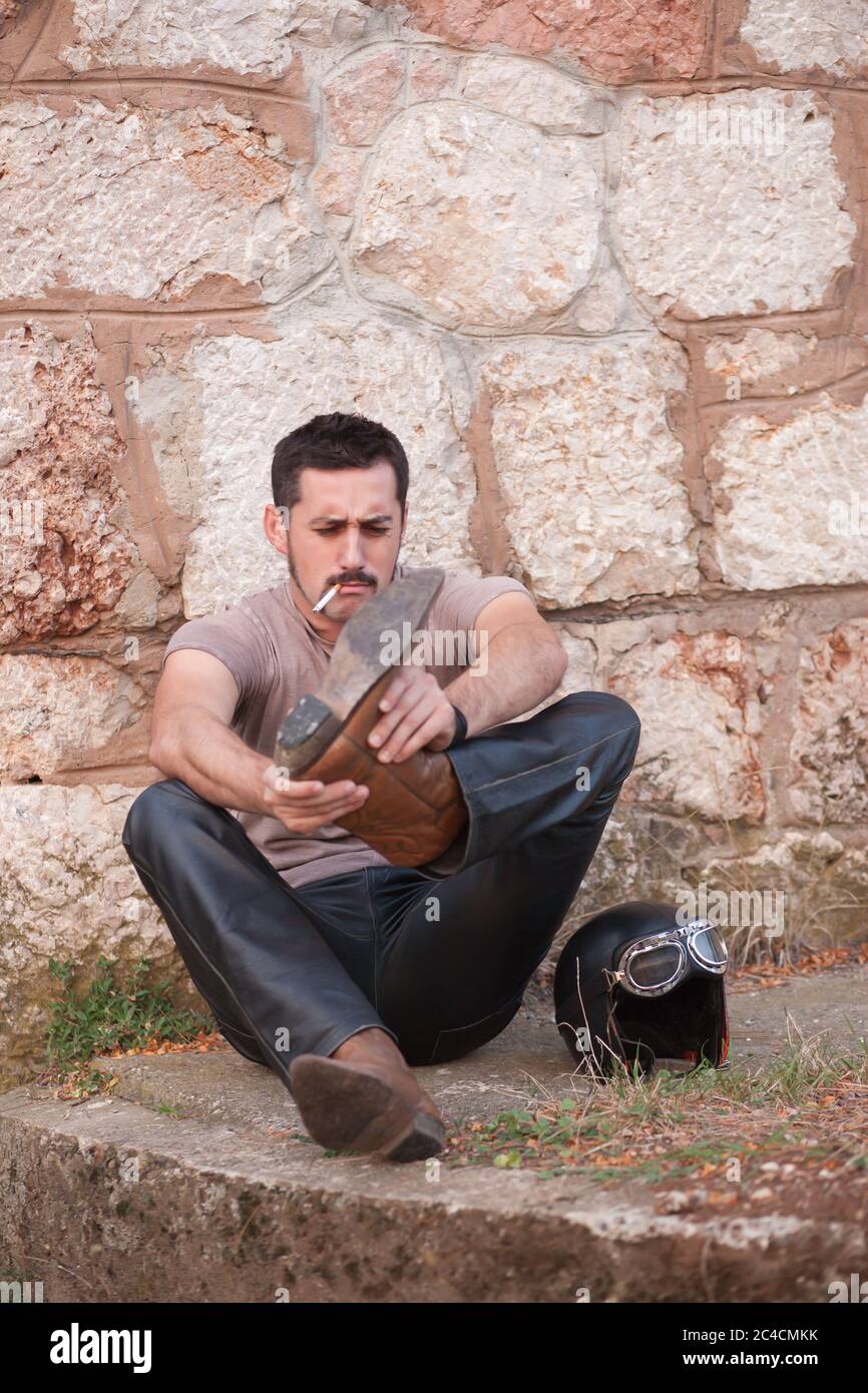 lifestyle young man with mustache, car, rock n roll Stock Photo - Alamy
