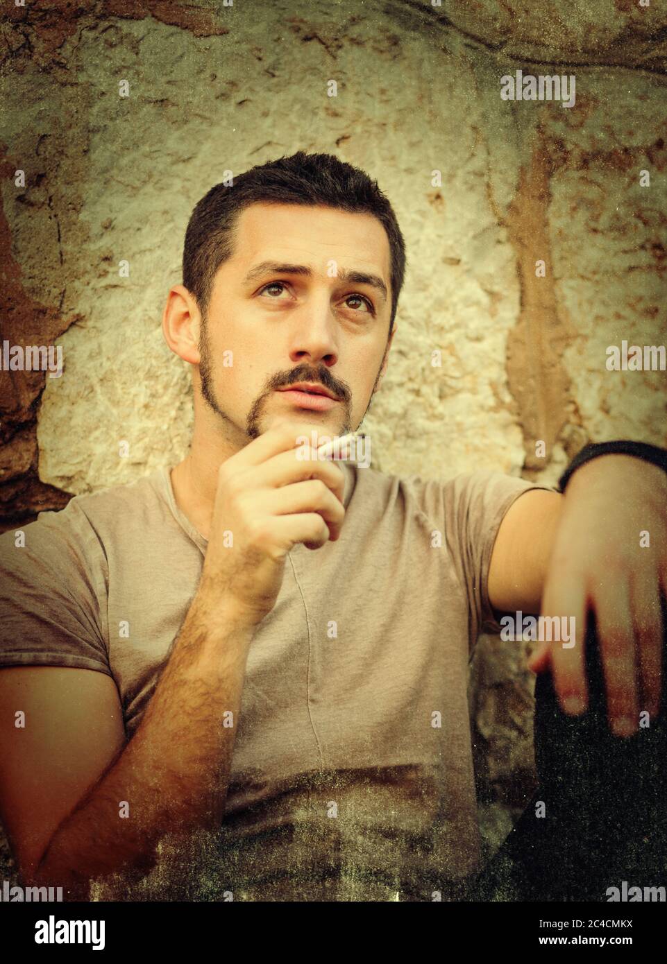 lifestyle young man with mustache, car, rock n roll Stock Photo - Alamy