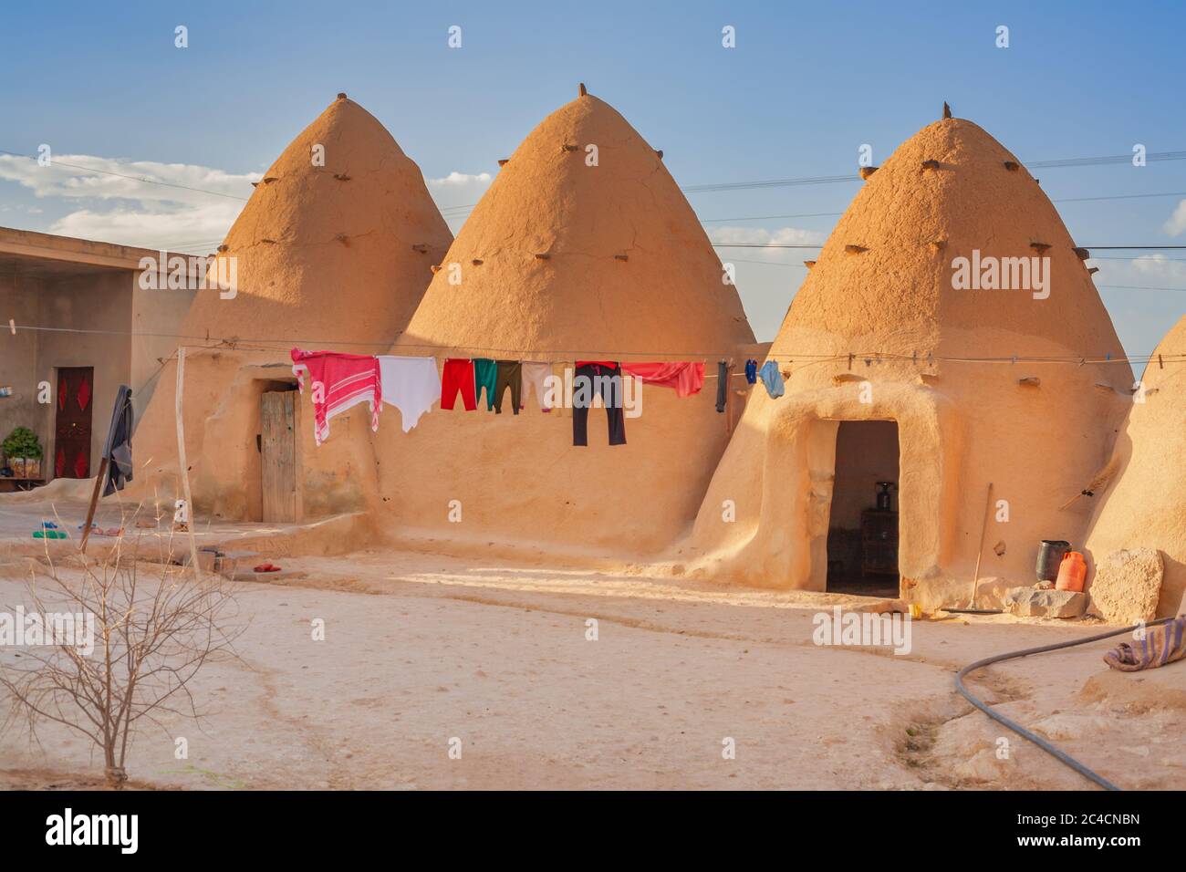 Village with traditional beehive house built of brick and mud, Srouj ...