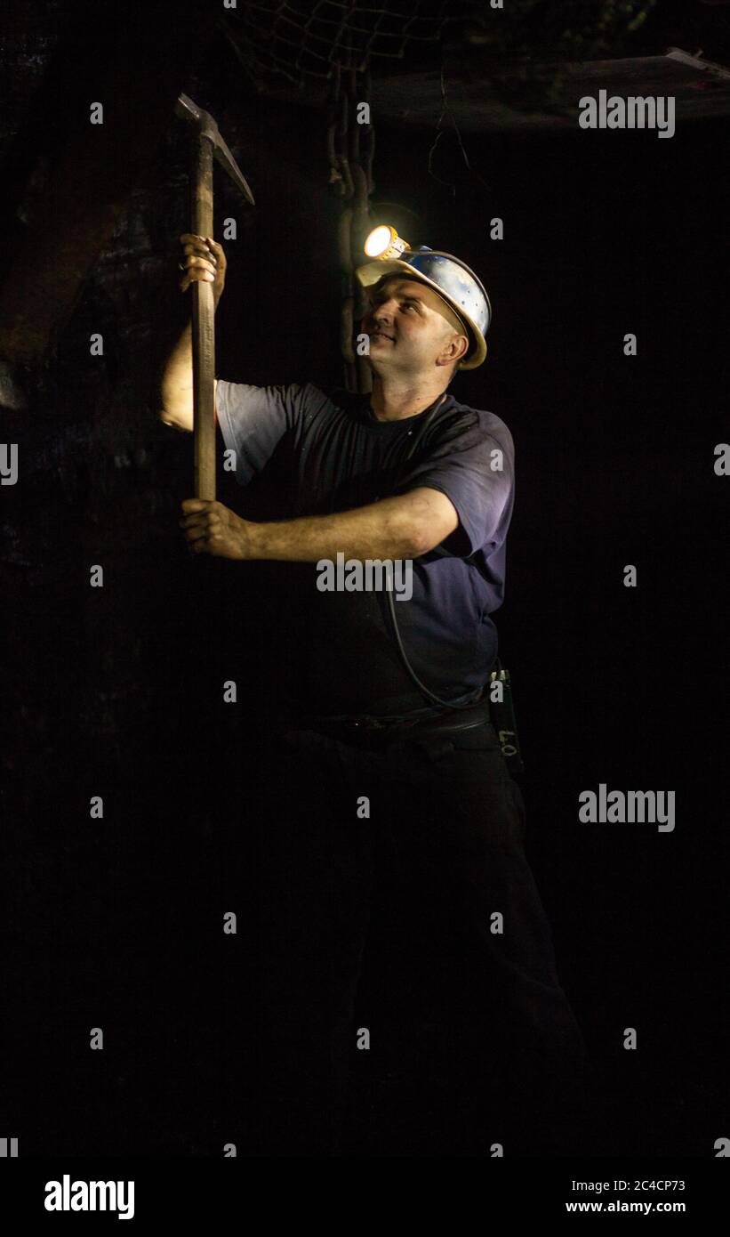 portraits of miners in a brown coal mine Stock Photo - Alamy