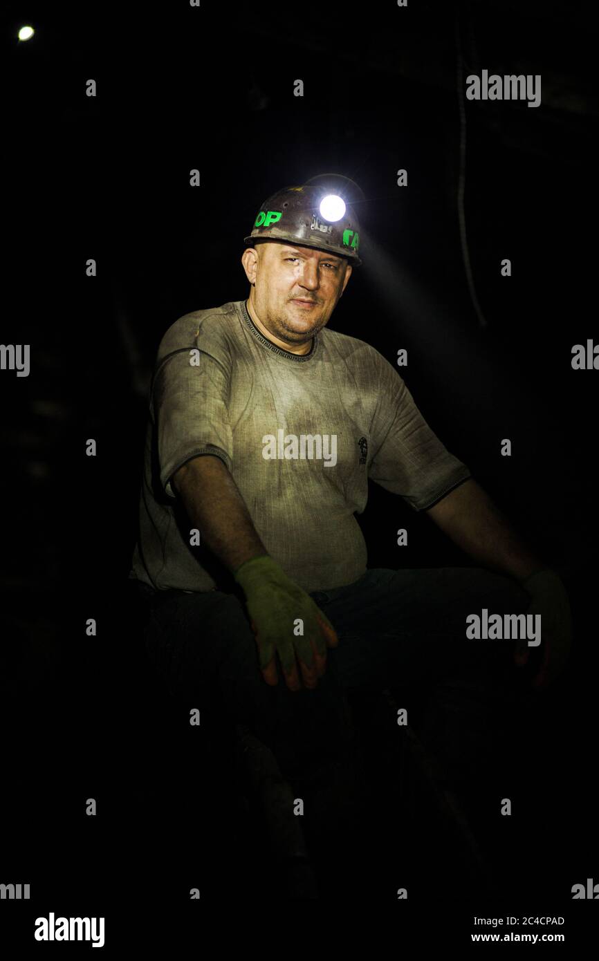 portraits of miners in a brown coal mine Stock Photo - Alamy