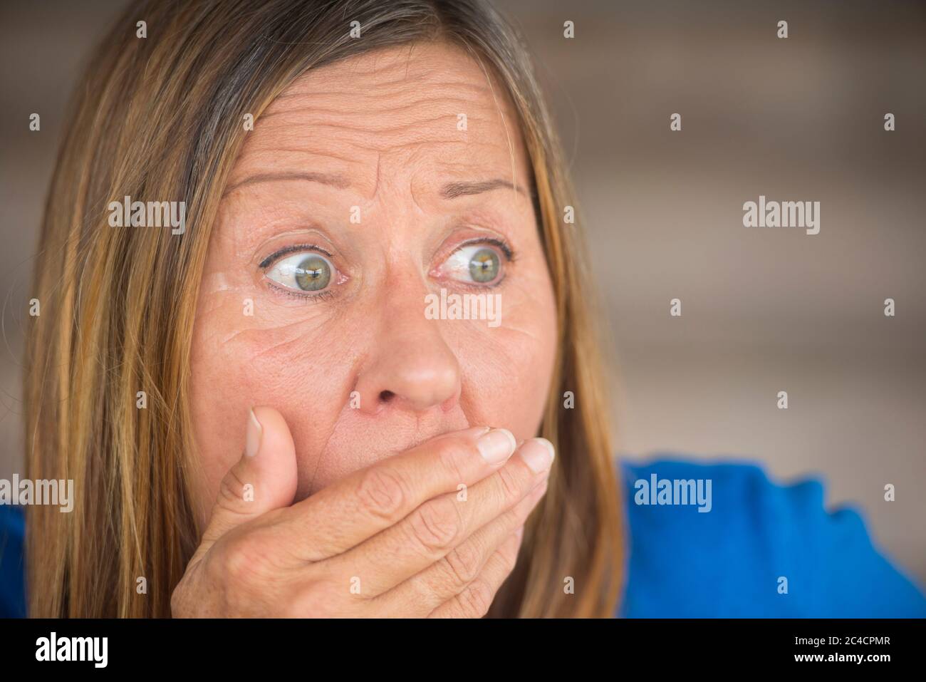 Portrait attractive mature woman with shocked, surprised, anxious ...