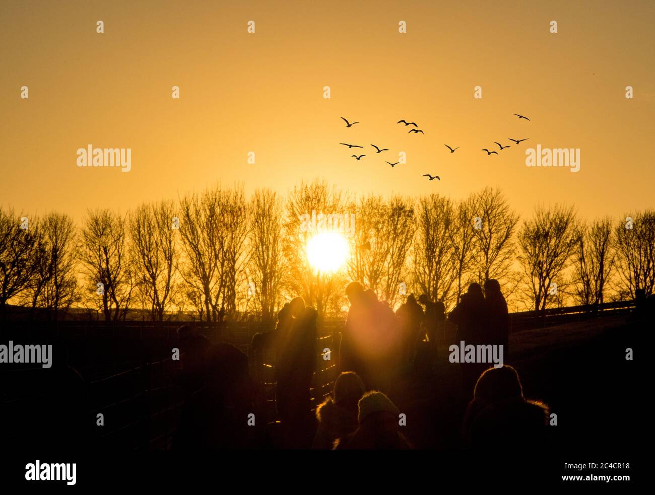The sun sets against a beautiful landscape. The location in ...