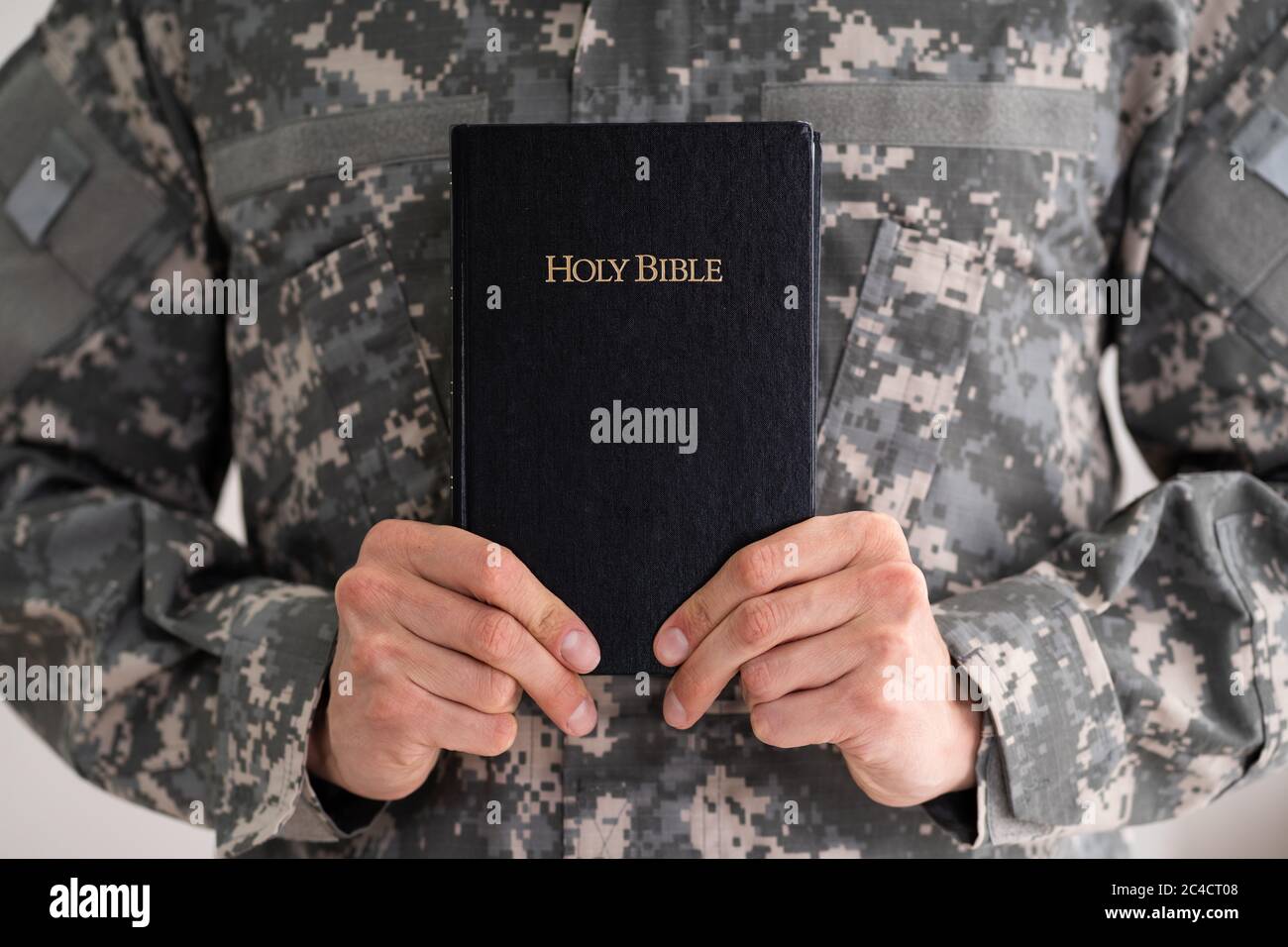 Patriotic Military Army Soldier Holding Bible In Uniform Stock Photo ...