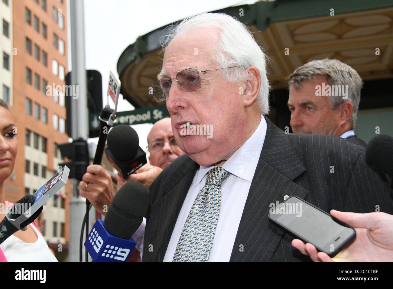 Barrister Greg James QC is surrounded by a media scrum as he leaves the ...
