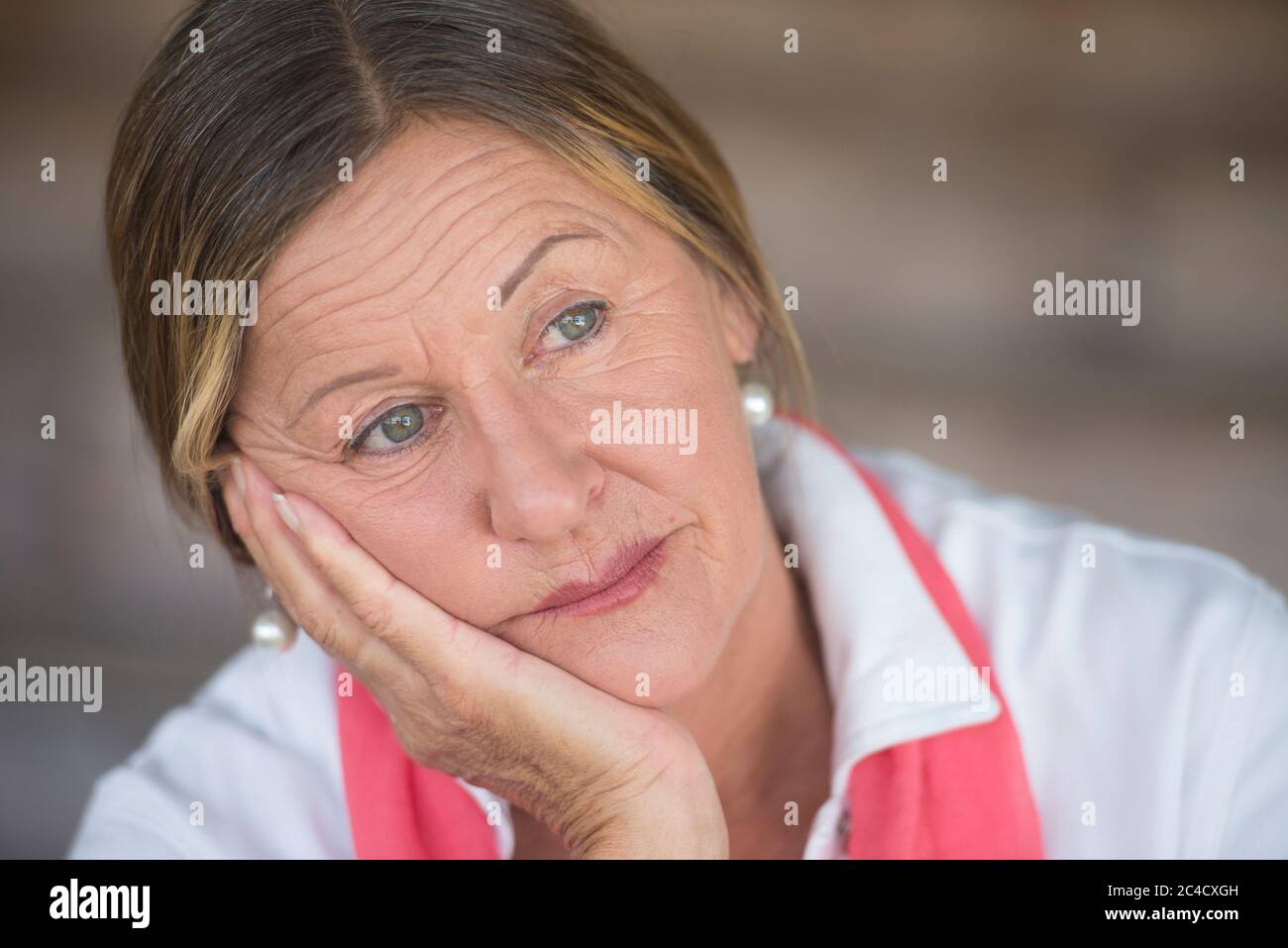 Portrait attractive mature woman with thoughtful worried concerned ...
