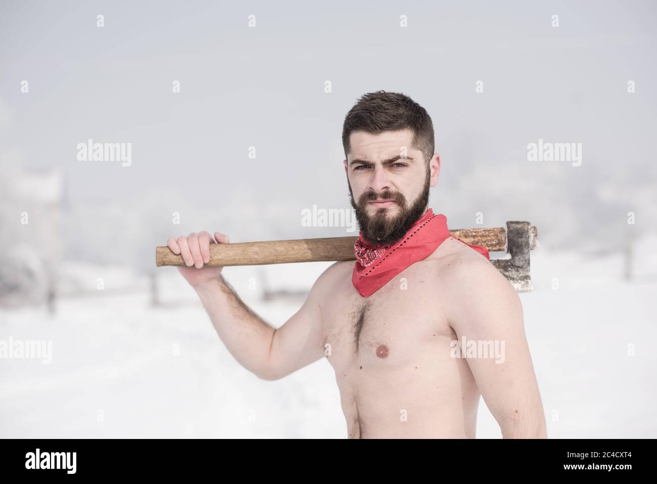 bearded man with an ax outside in winter Stock Photo - Alamy