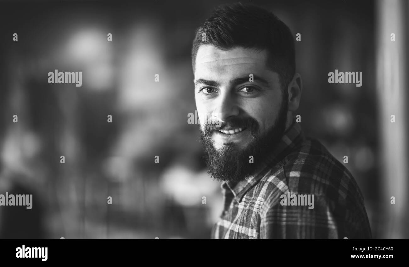 Bearded happy man posing Black and White Stock Photos & Images - Alamy