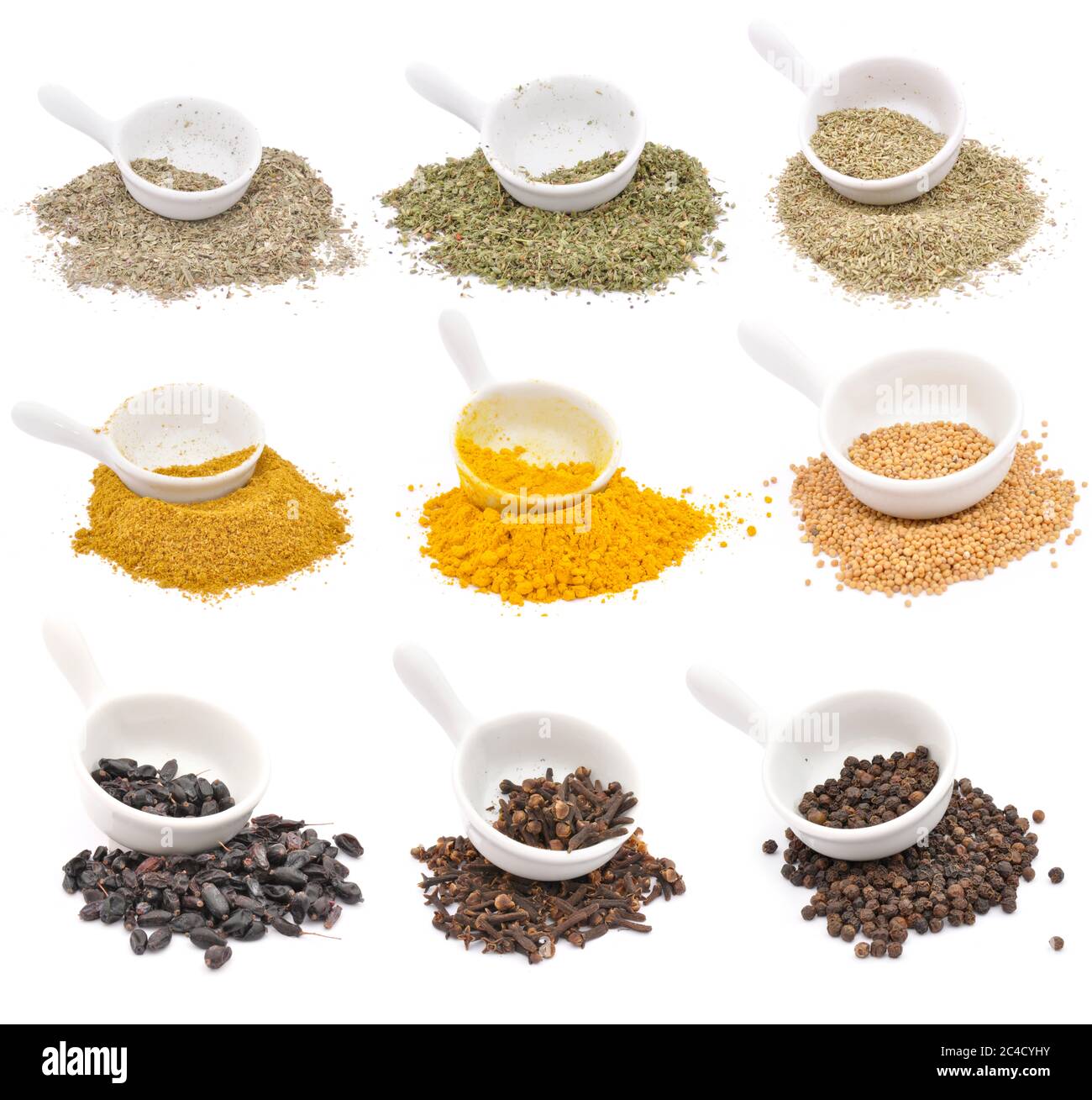 Spices in white bowls Stock Photo - Alamy