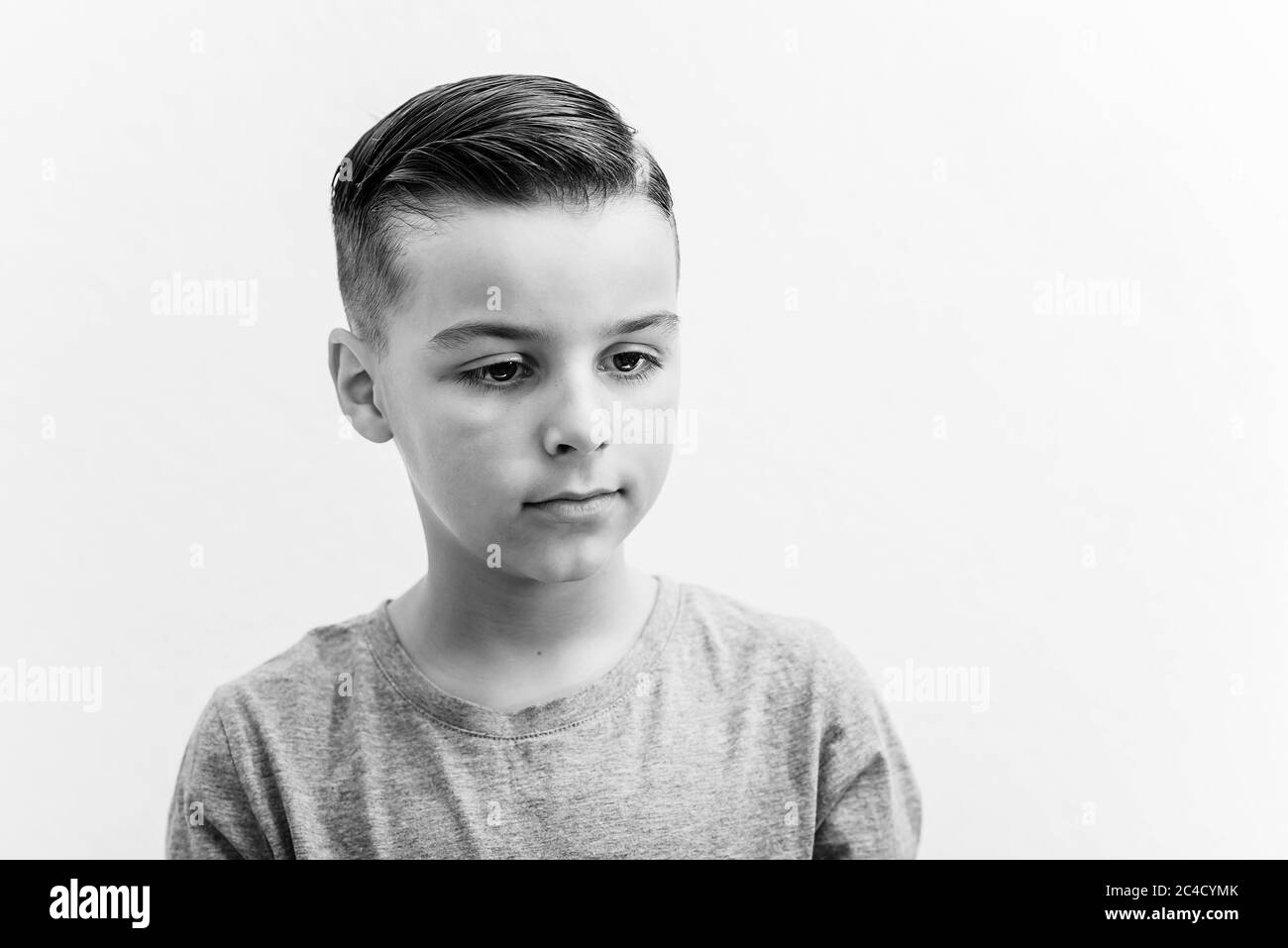 Boy studio background Black and White Stock Photos & Images - Alamy