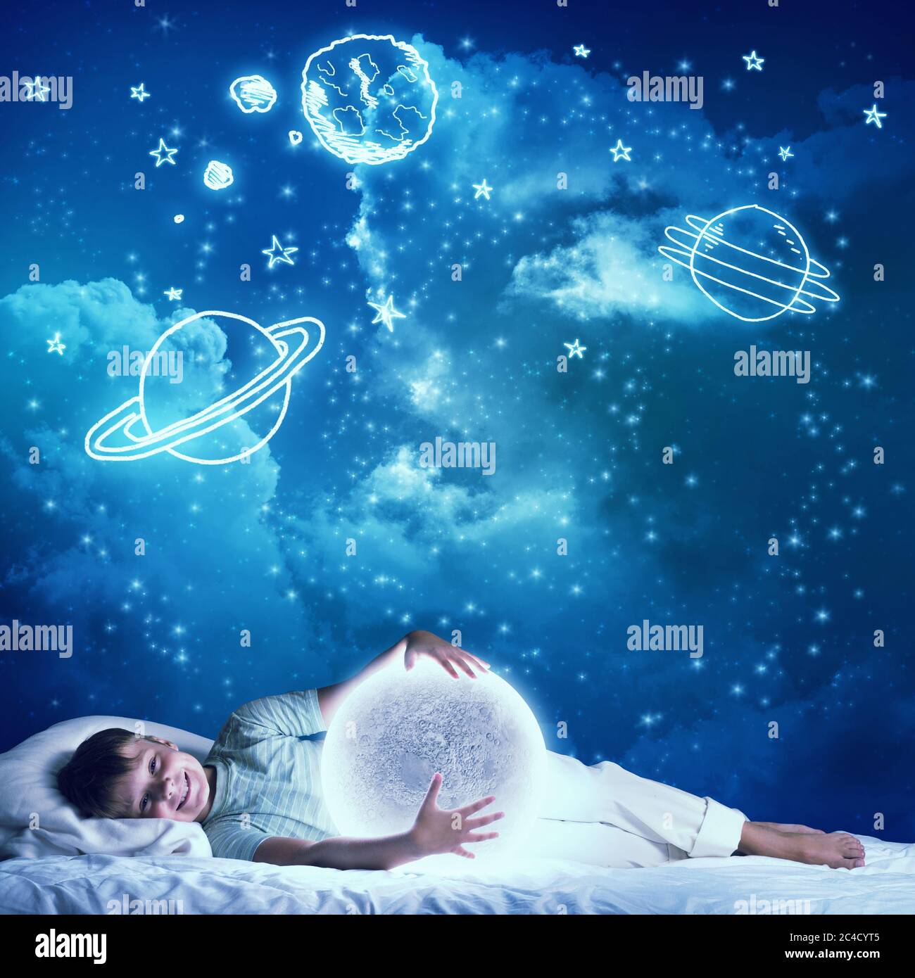 Boy dreaming before sleep Stock Photo - Alamy