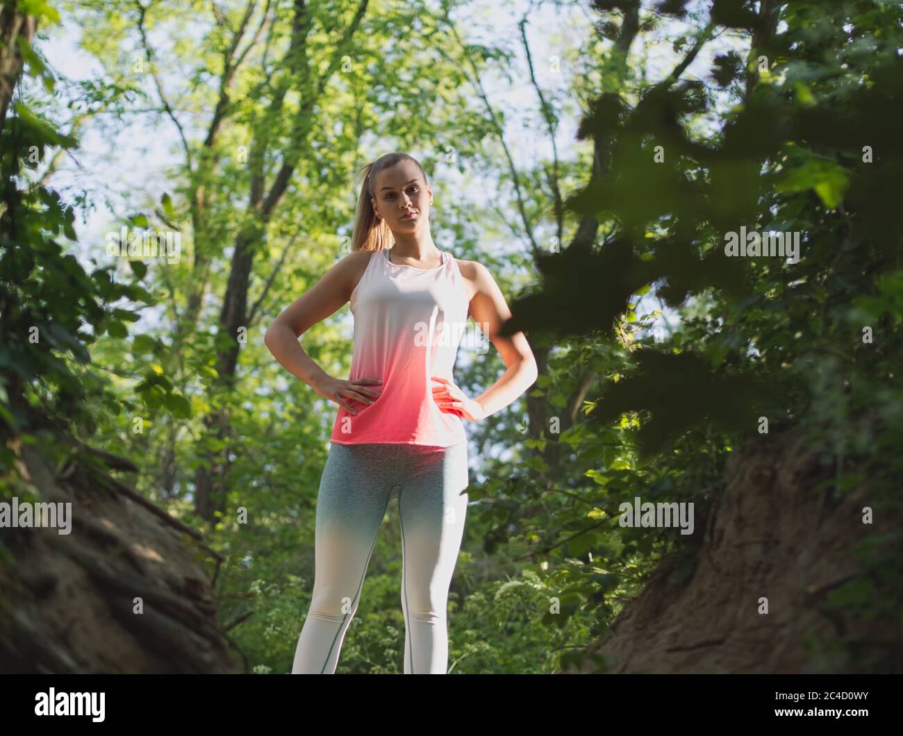 Young Blonde Caucasian Female Forest Runner Posing Stock Photo - Alamy
