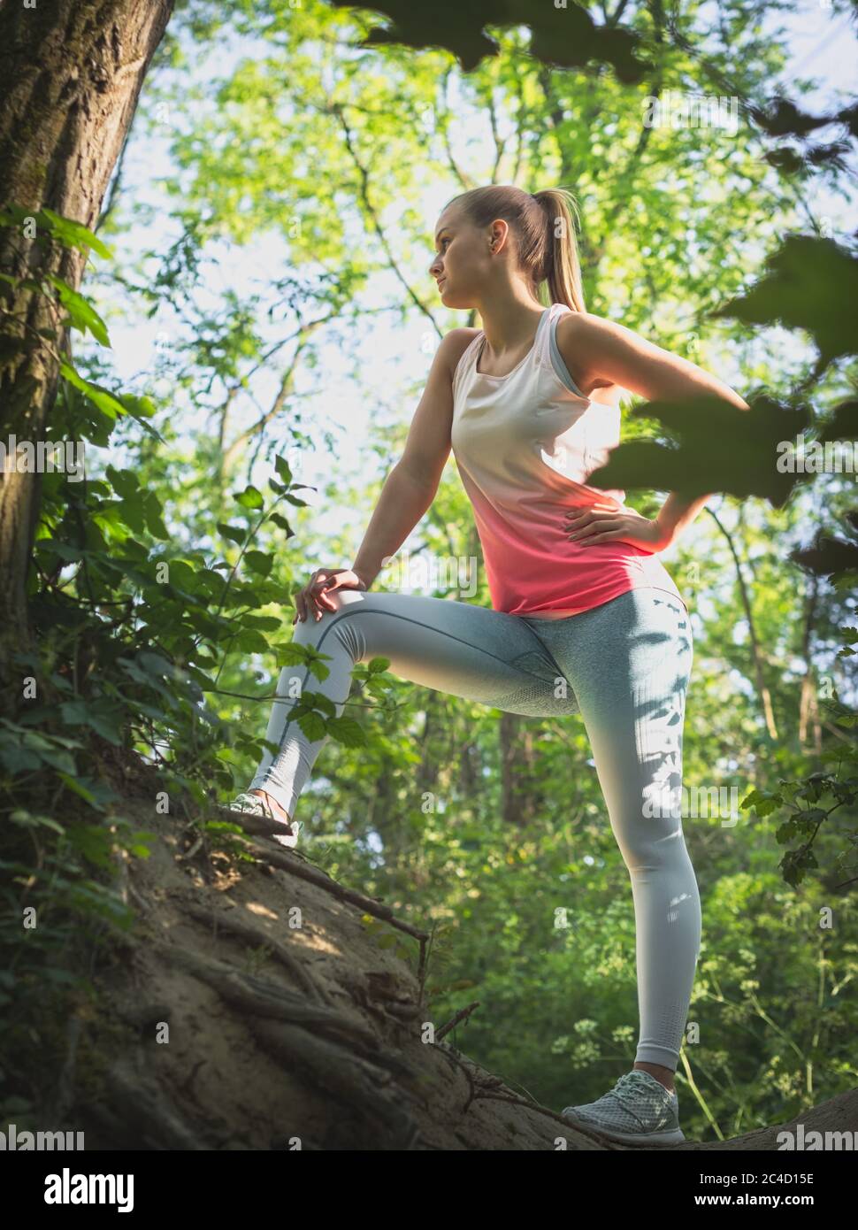 Young Blonde Caucasian Female Forest Runner Posing Stock Photo - Alamy