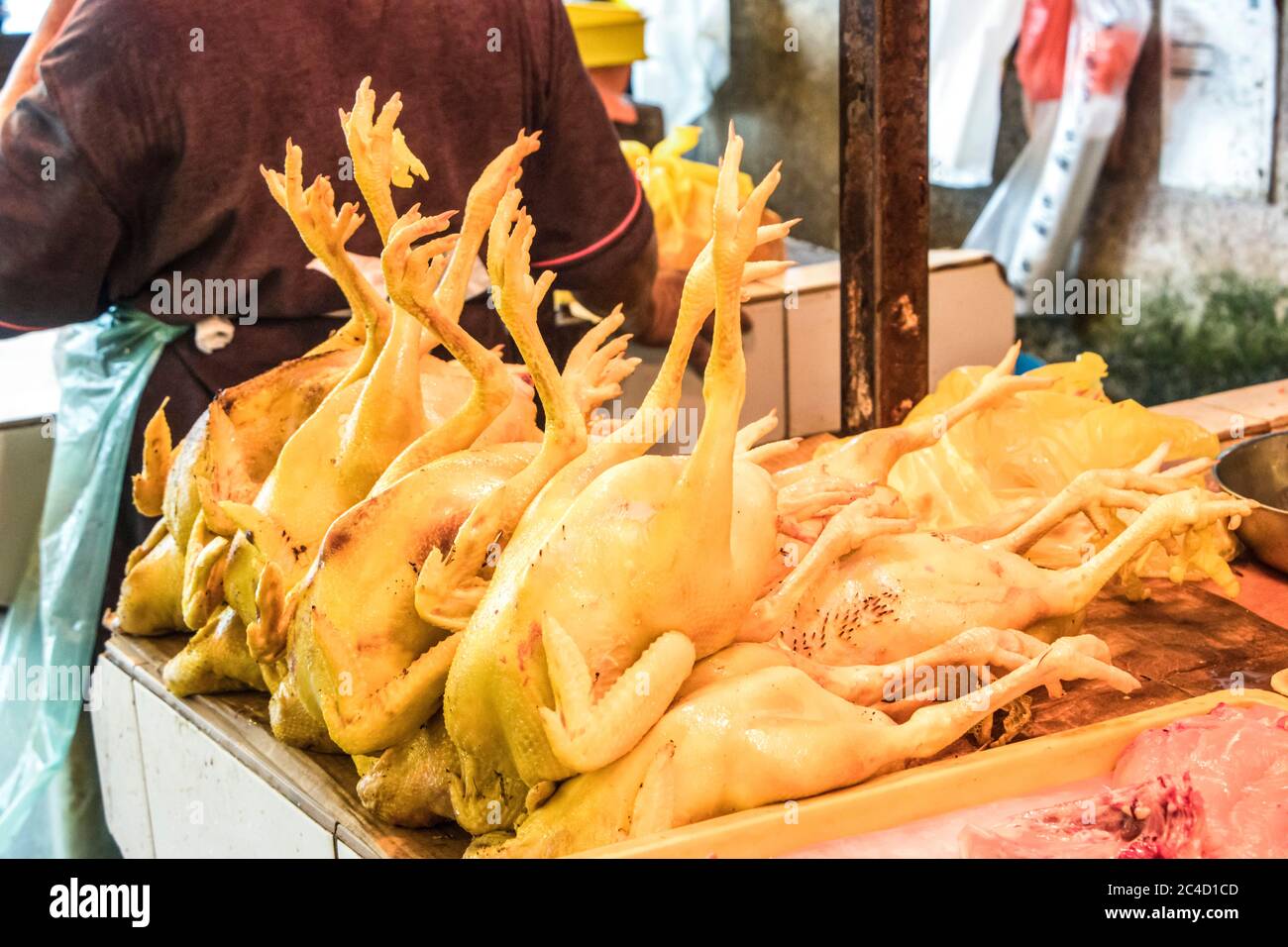 plucked chickens displayed on stall in chow kit wet market in Kuala ...