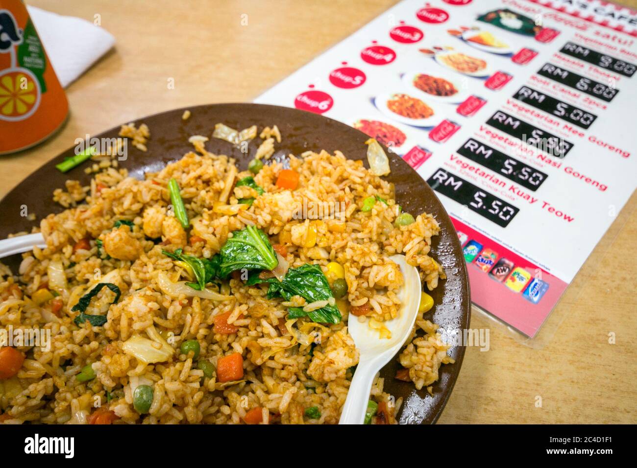 malaysian rice dish on a plate and menu in Kuala Lumpur Malaysia Stock ...