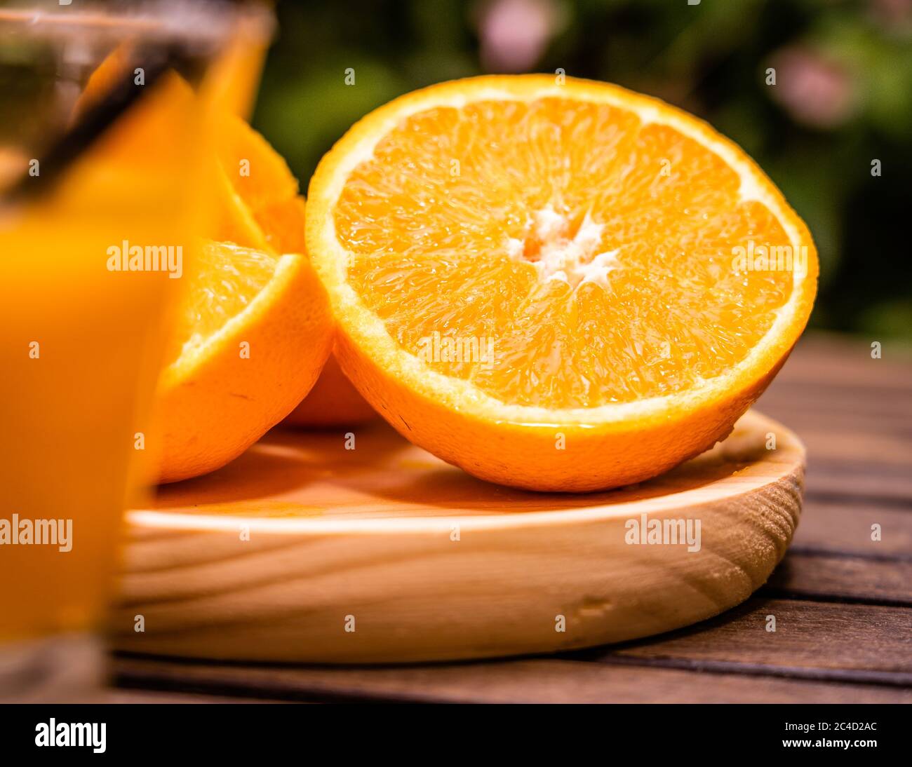 Closeup shot of cut orange slices on a wooden surface - perfect for ...