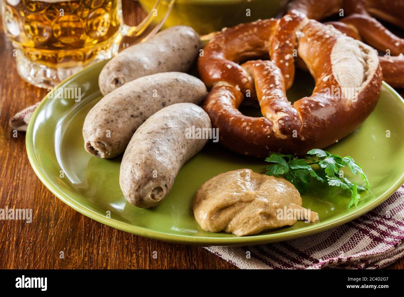 Bavarian breakfast with white sausage, pretzel and beer Stock Photo - Alamy