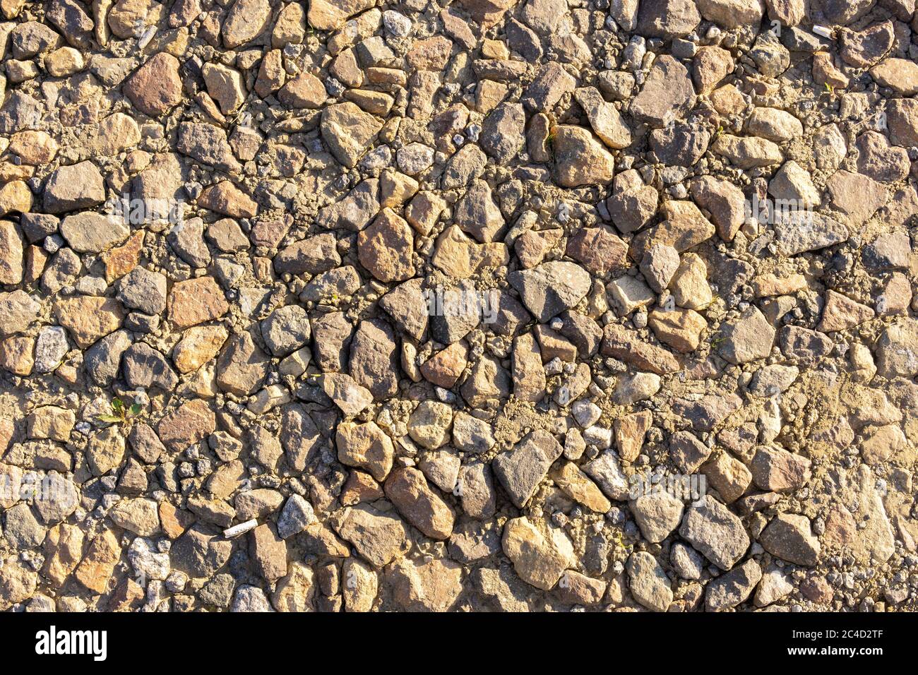 abstract textured background of stones yellow cobblestones Stock Photo ...