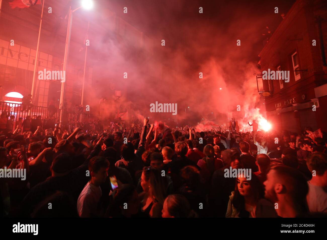 Liverpool fans let off flares outside Anfield, Liverpool Stock Photo ...