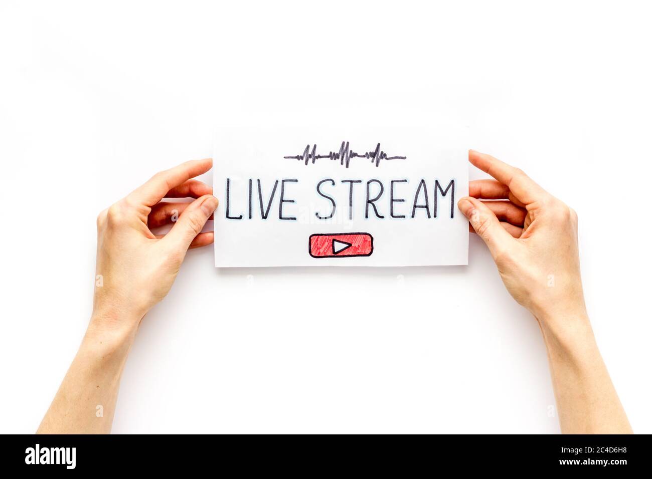 Live streaming web network concept. Female hands holding paper tablet ...