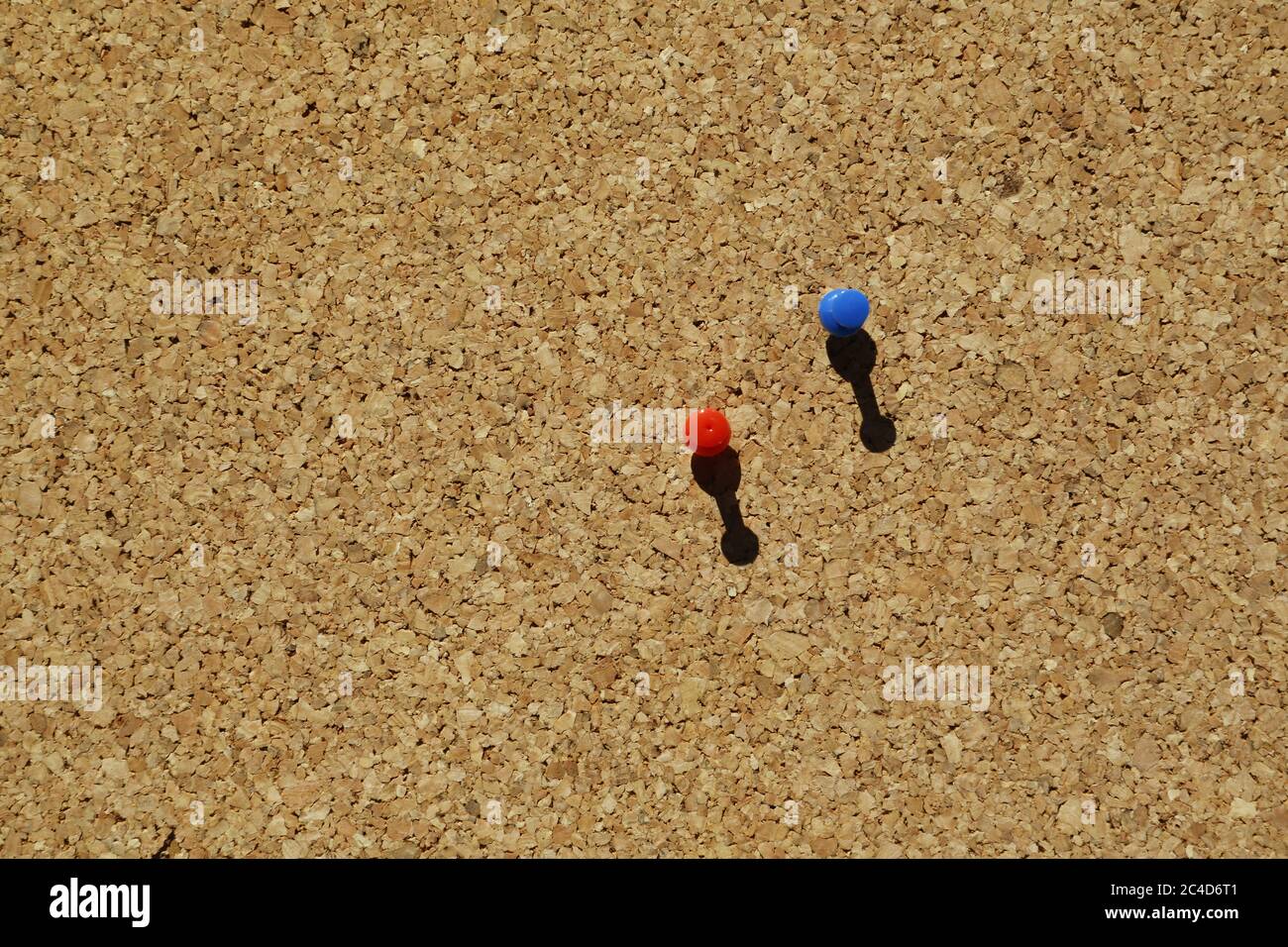 red and blue Steel Pushpin on board Stock Photo - Alamy