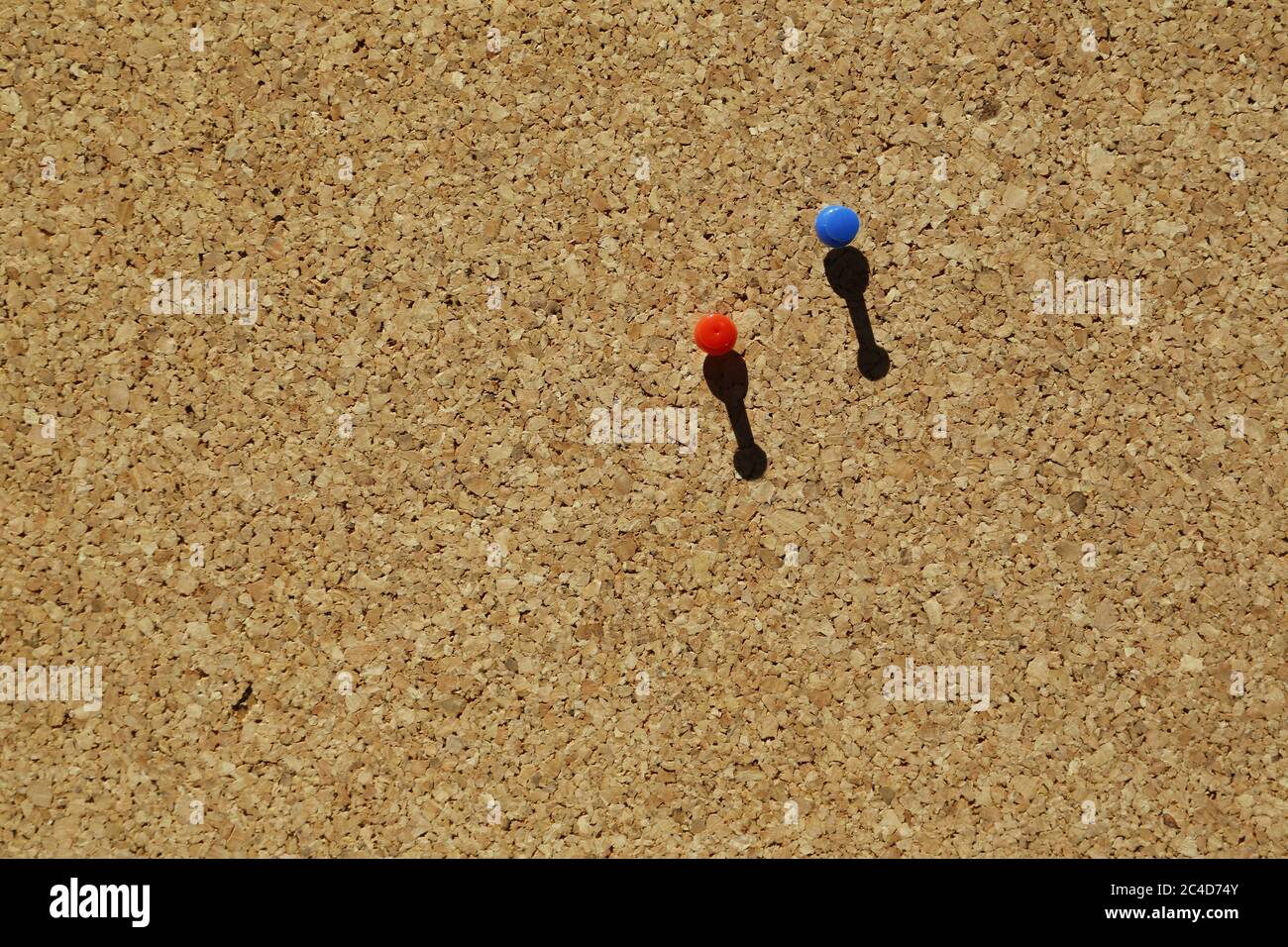 red and blue Steel Pushpin on board Stock Photo - Alamy