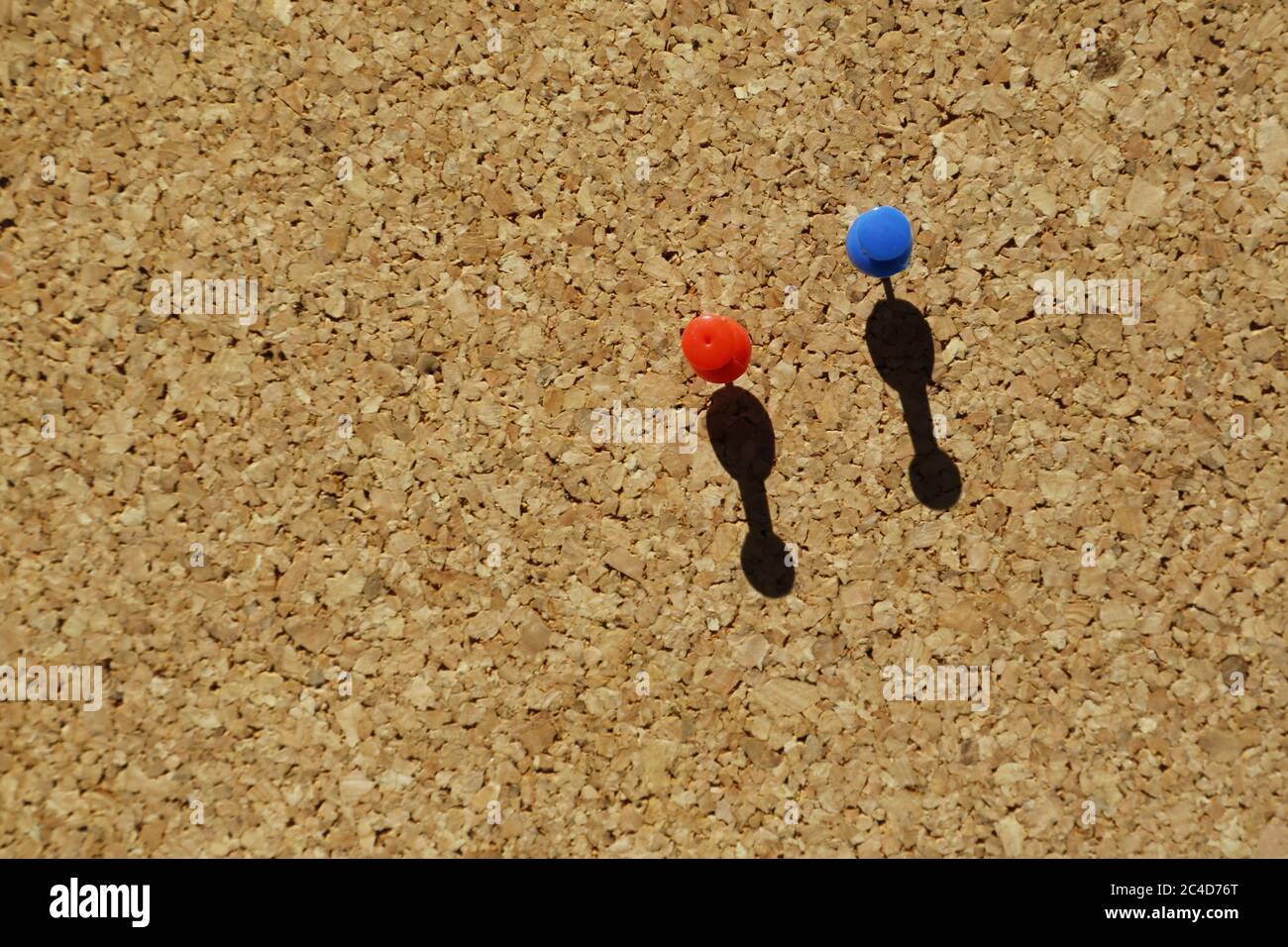 red and blue Steel Pushpin on board Stock Photo - Alamy