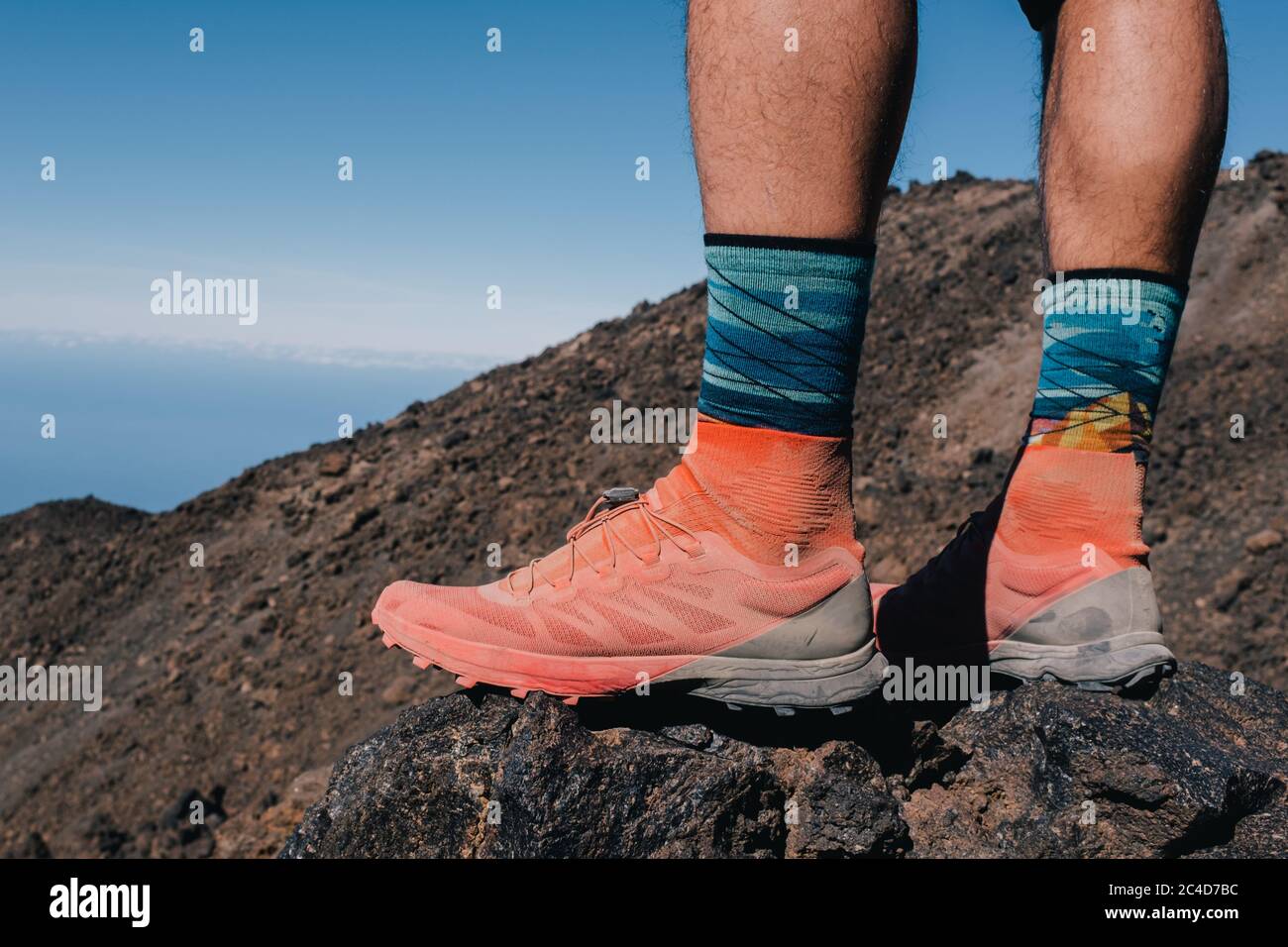 Successful runner hiker enjoy the view on mountain top cliff edge Stock ...