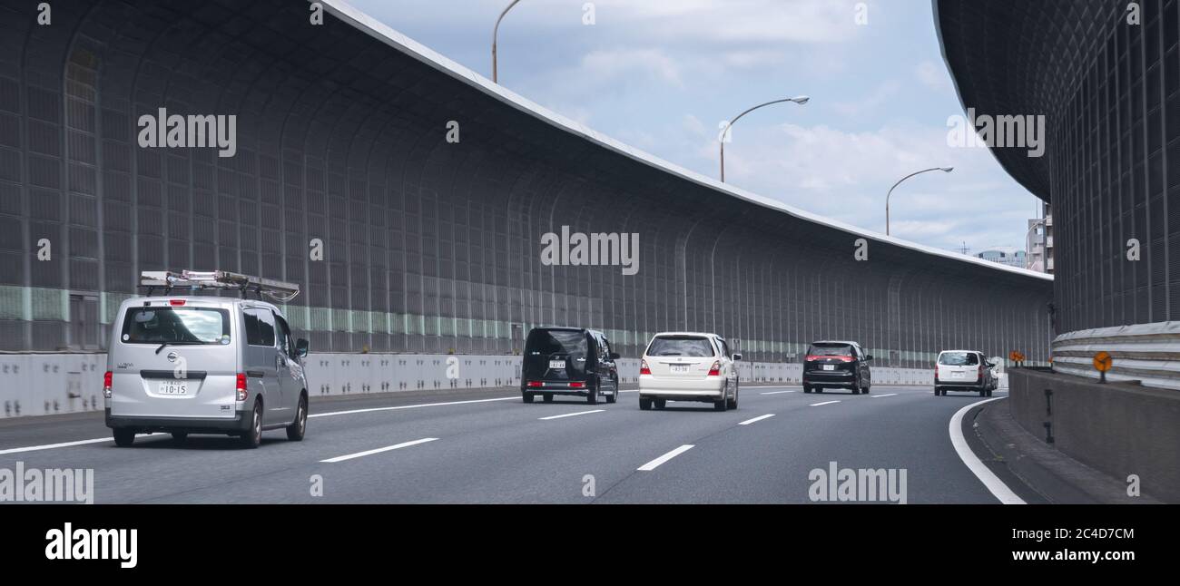 Vehicles driving through Higashi Kanto Expressway, Tokyo, Japan Stock ...