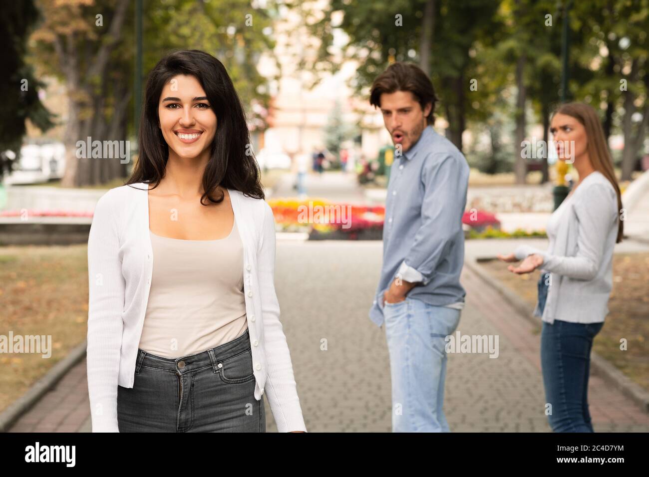 Man Being Distracted By Attractive Girl Walking With Girlfriend Outdoor ...